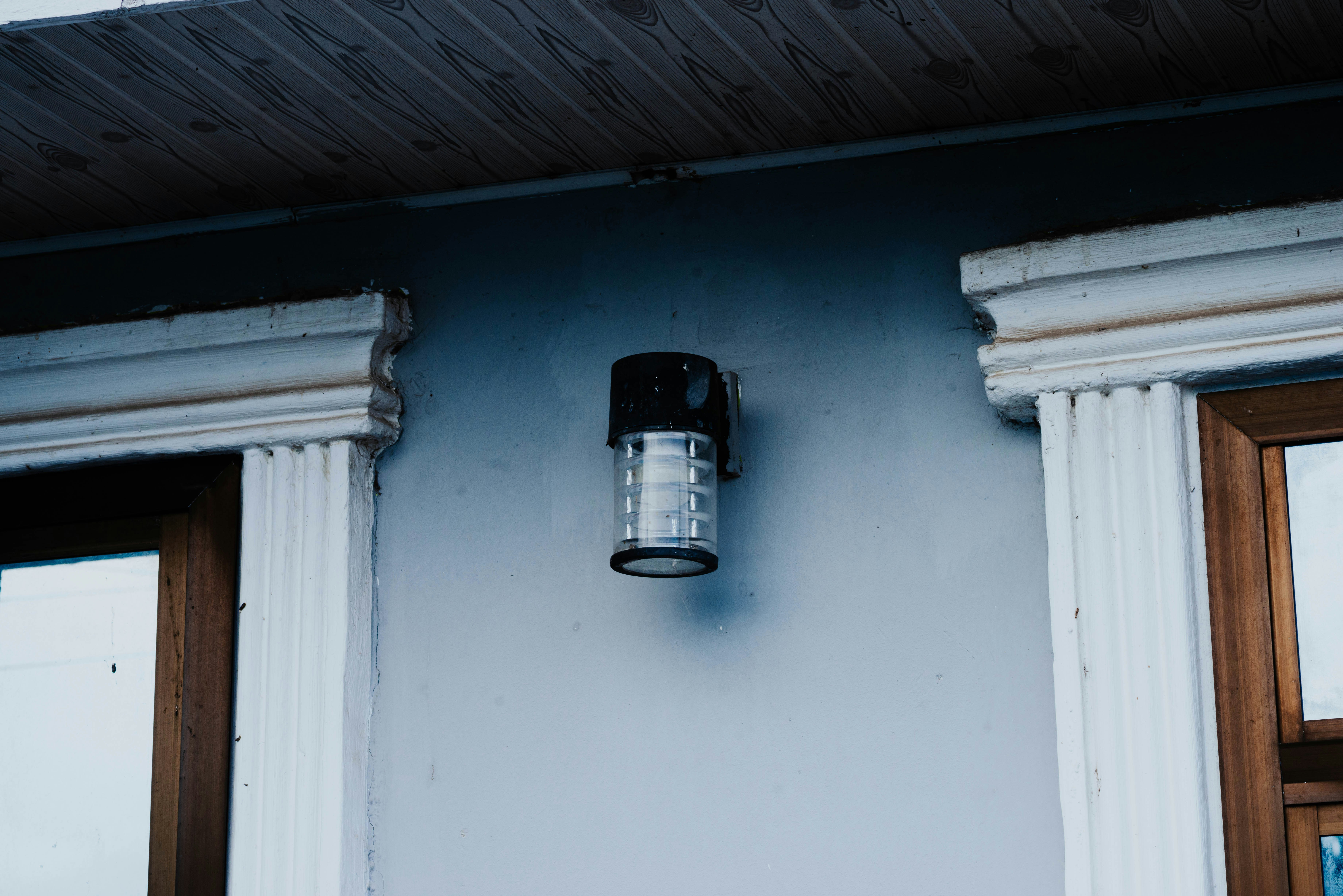 Midnight Lantern on a Quiet Facade