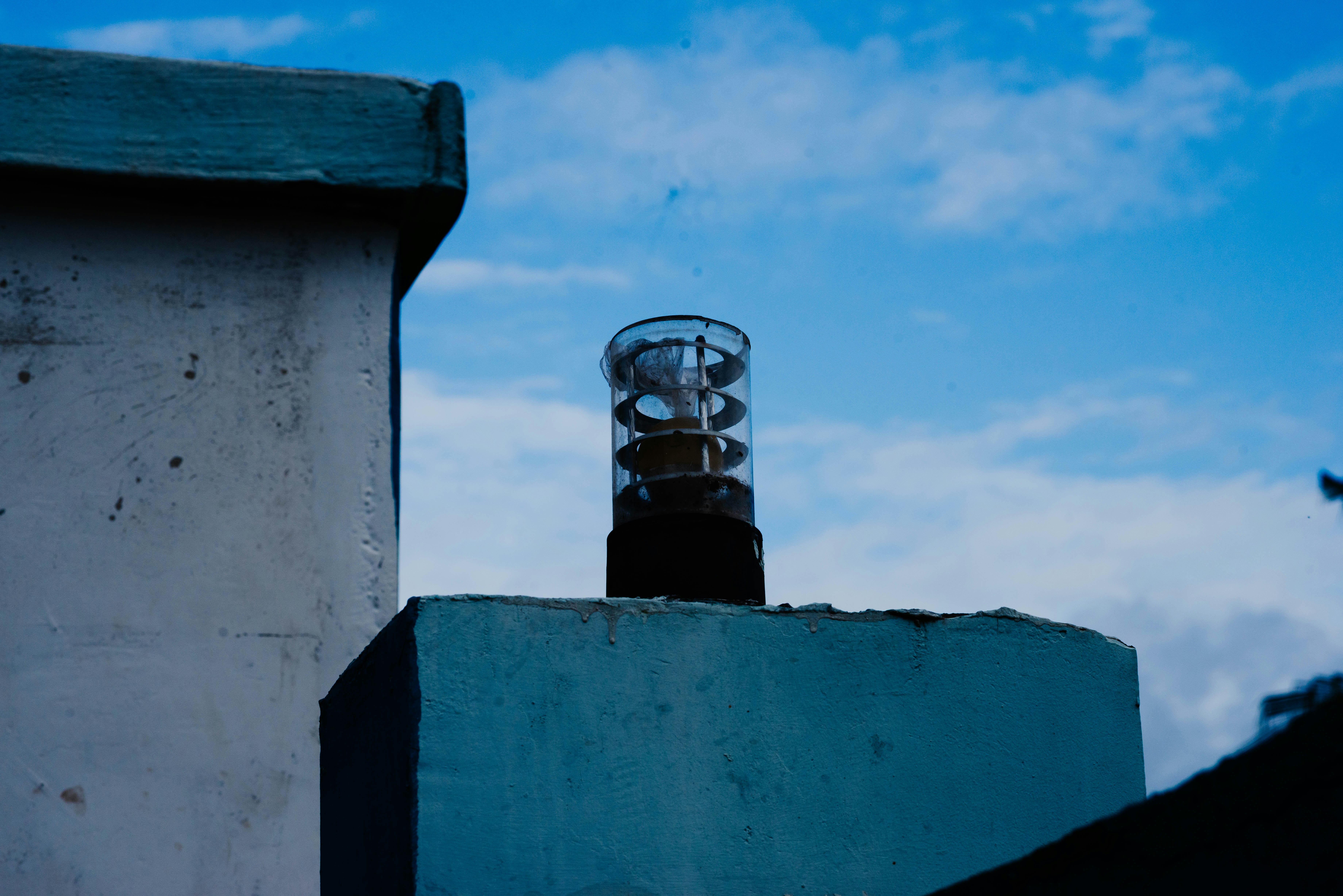 Chimney Sentinel under a Clear Blue Sky