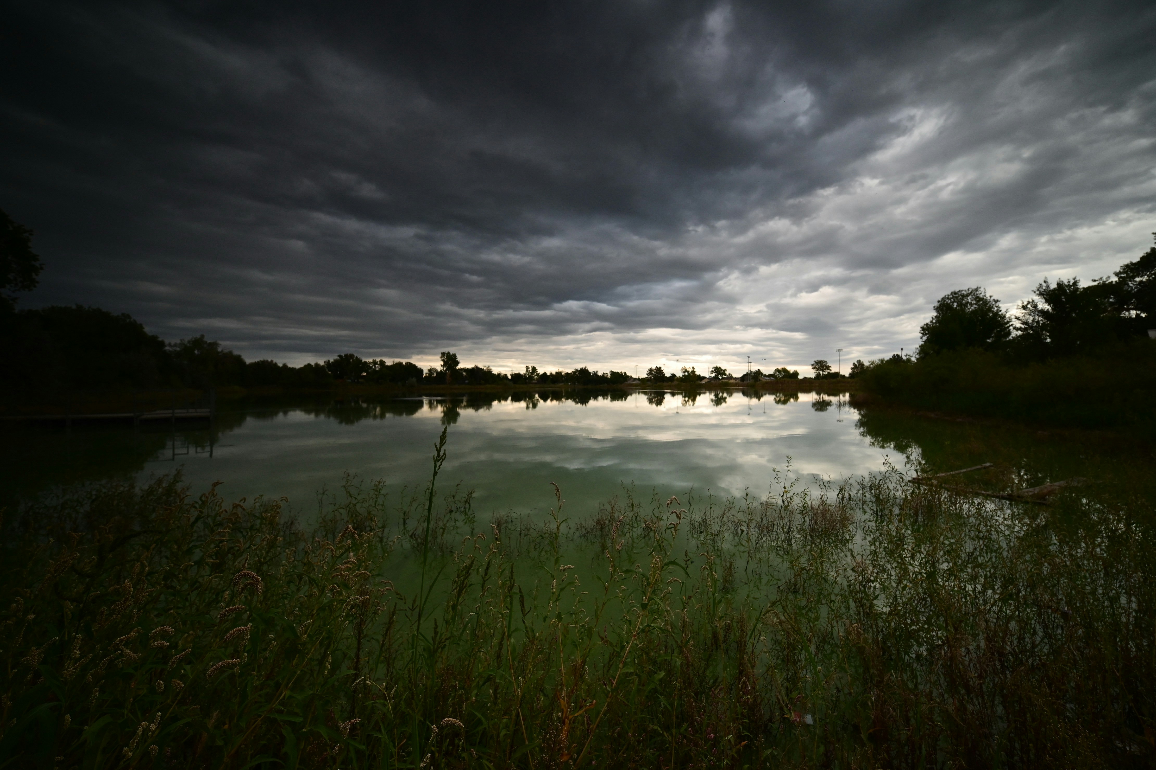 Storm-crest at the Water: A Wide, Moody Lake