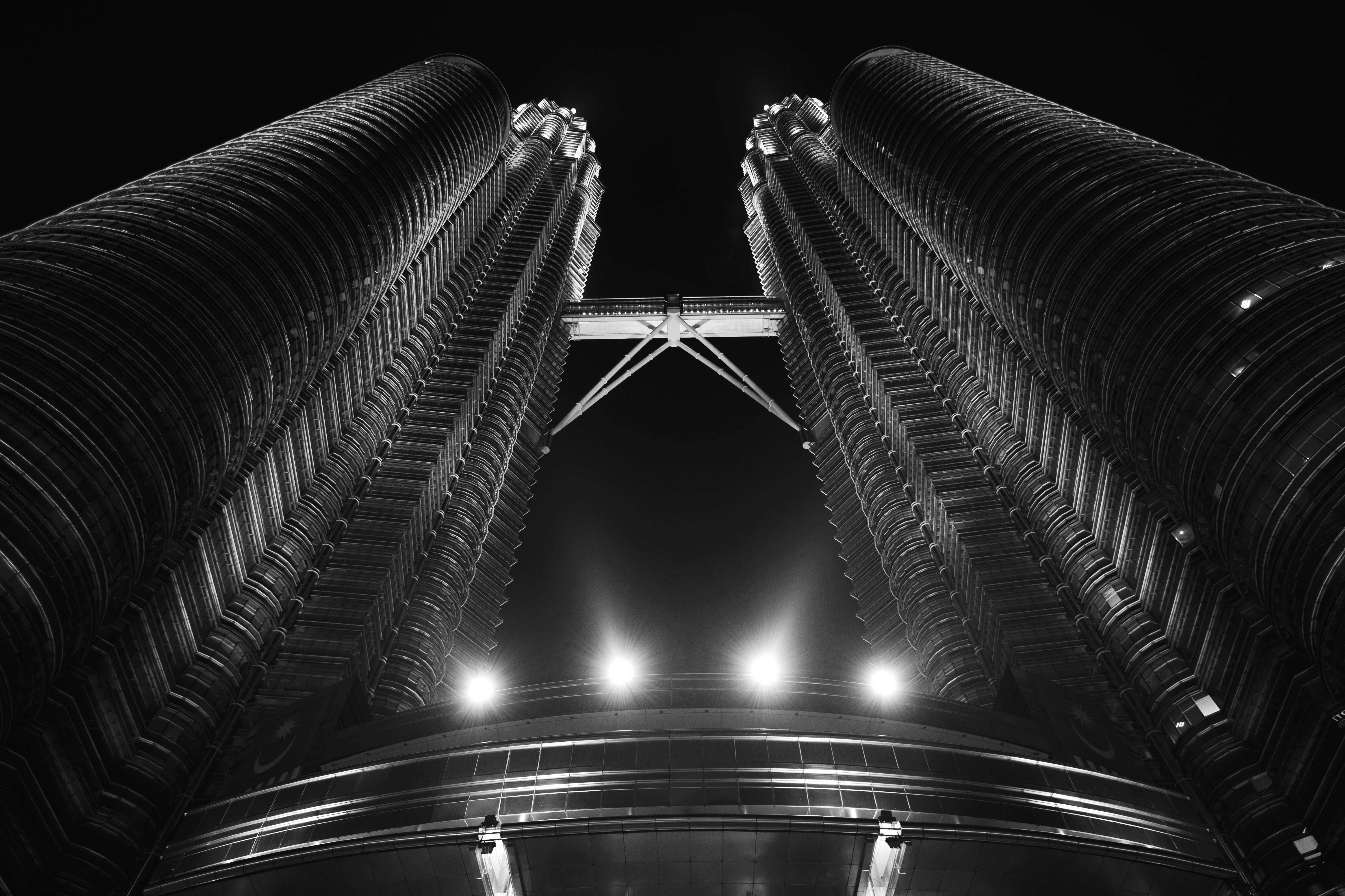Towering Steel Monoliths: A Night Descent Beneath the Urban Giants
