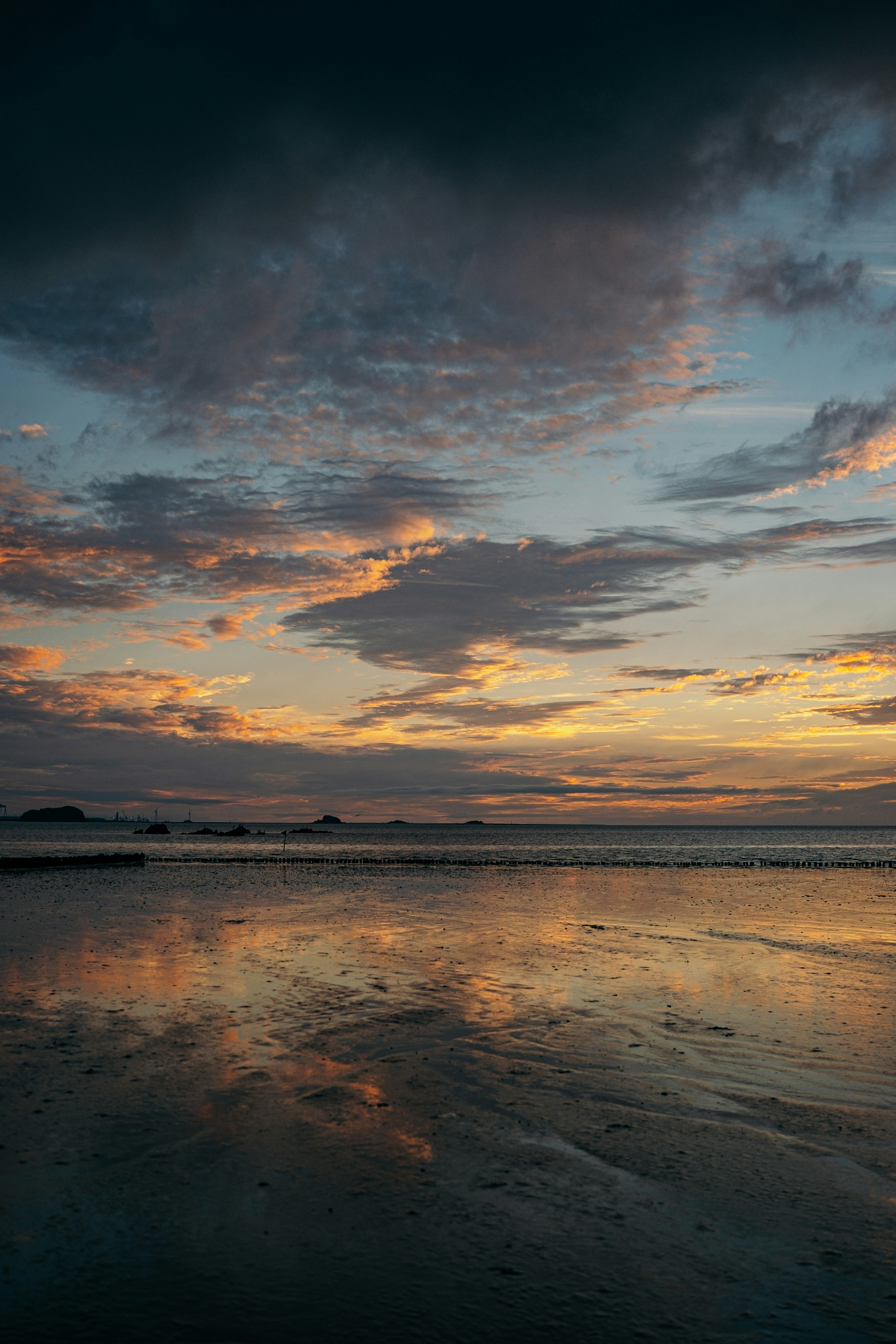 Sunset Echoes on the Tidal Mirror