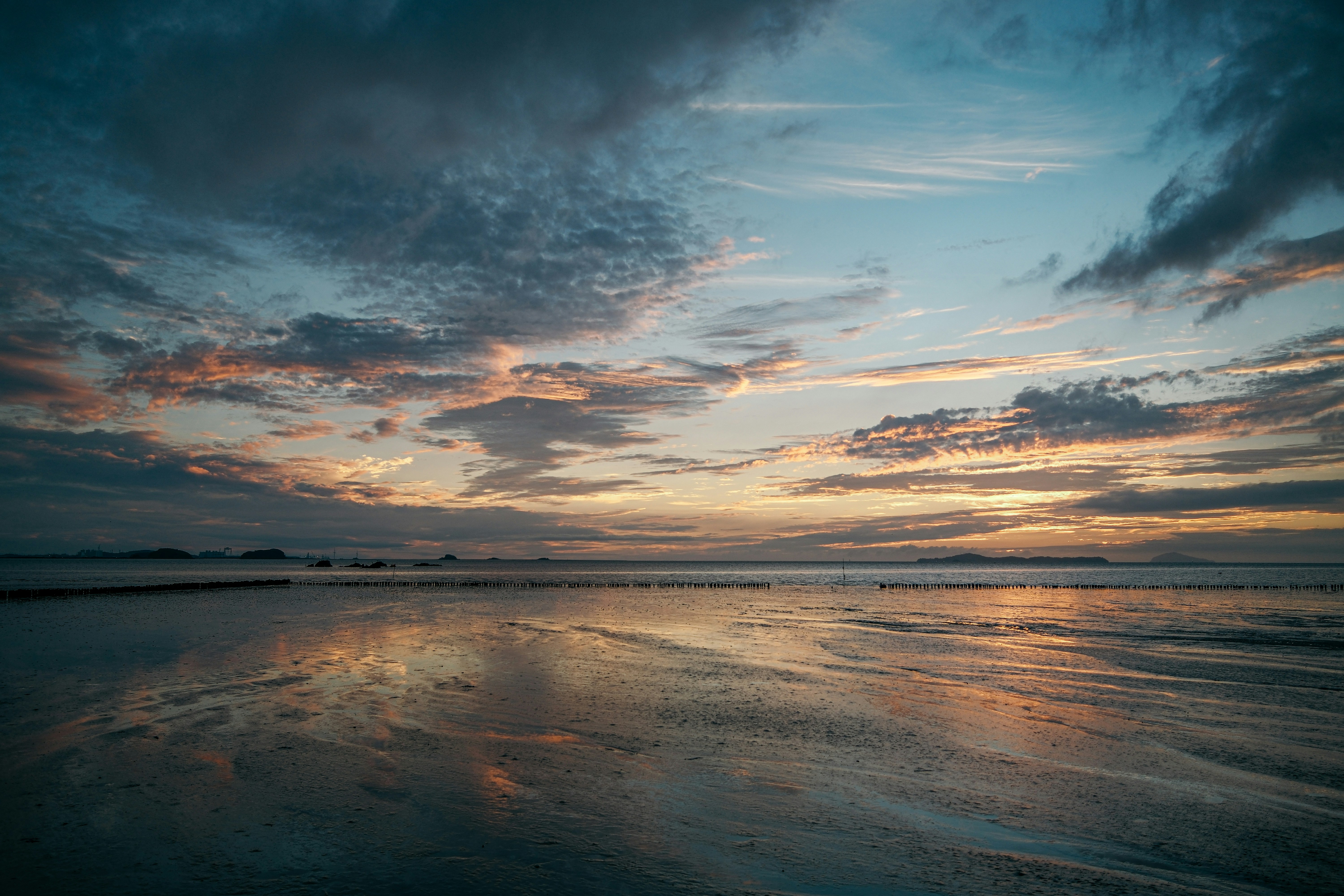 Sunset on the Quiet Shore: A Sky Reflected