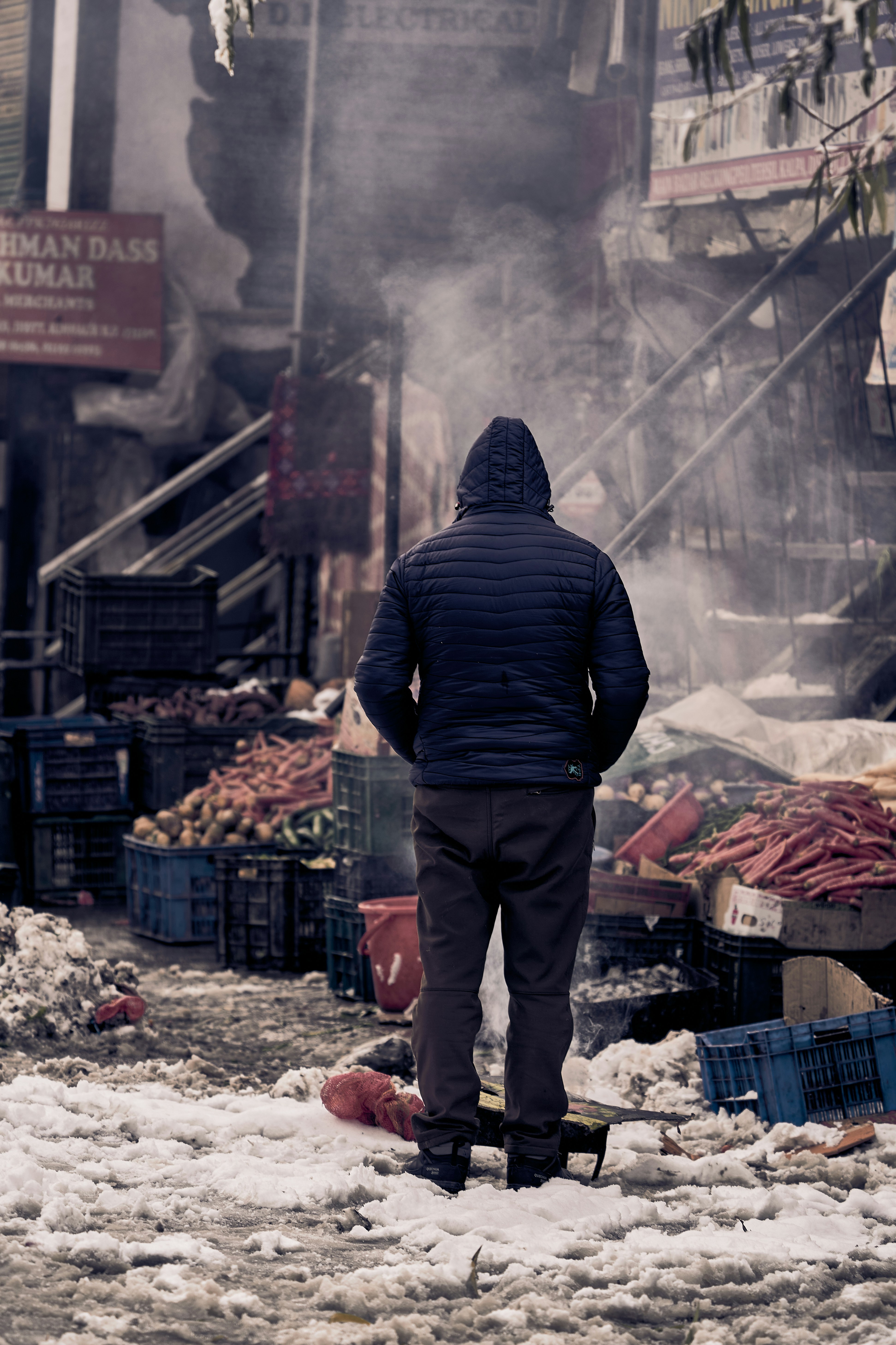 The Silent Figure Among Snow and Smoke
