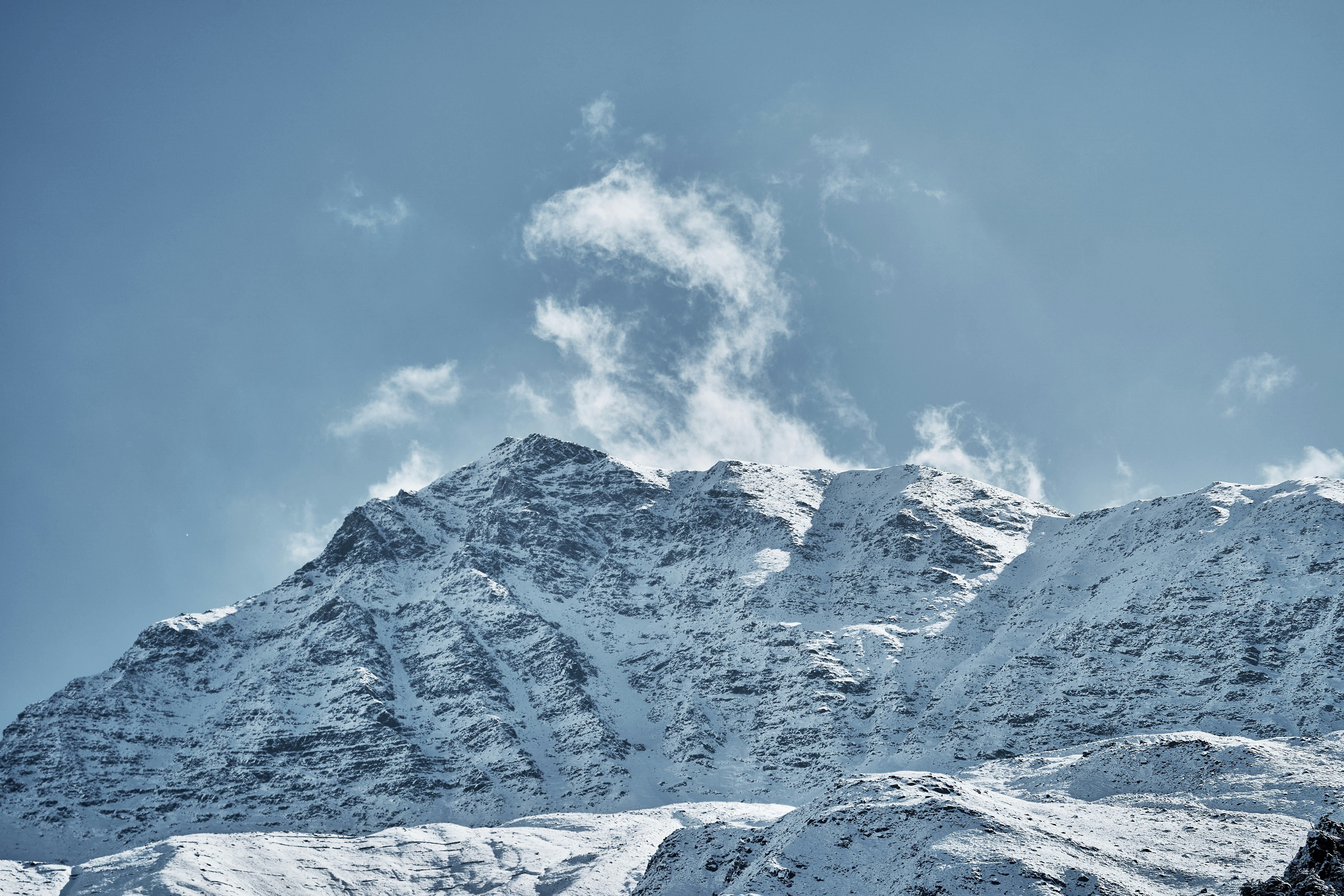 Snowbound Crest under a Clear Blue Sky