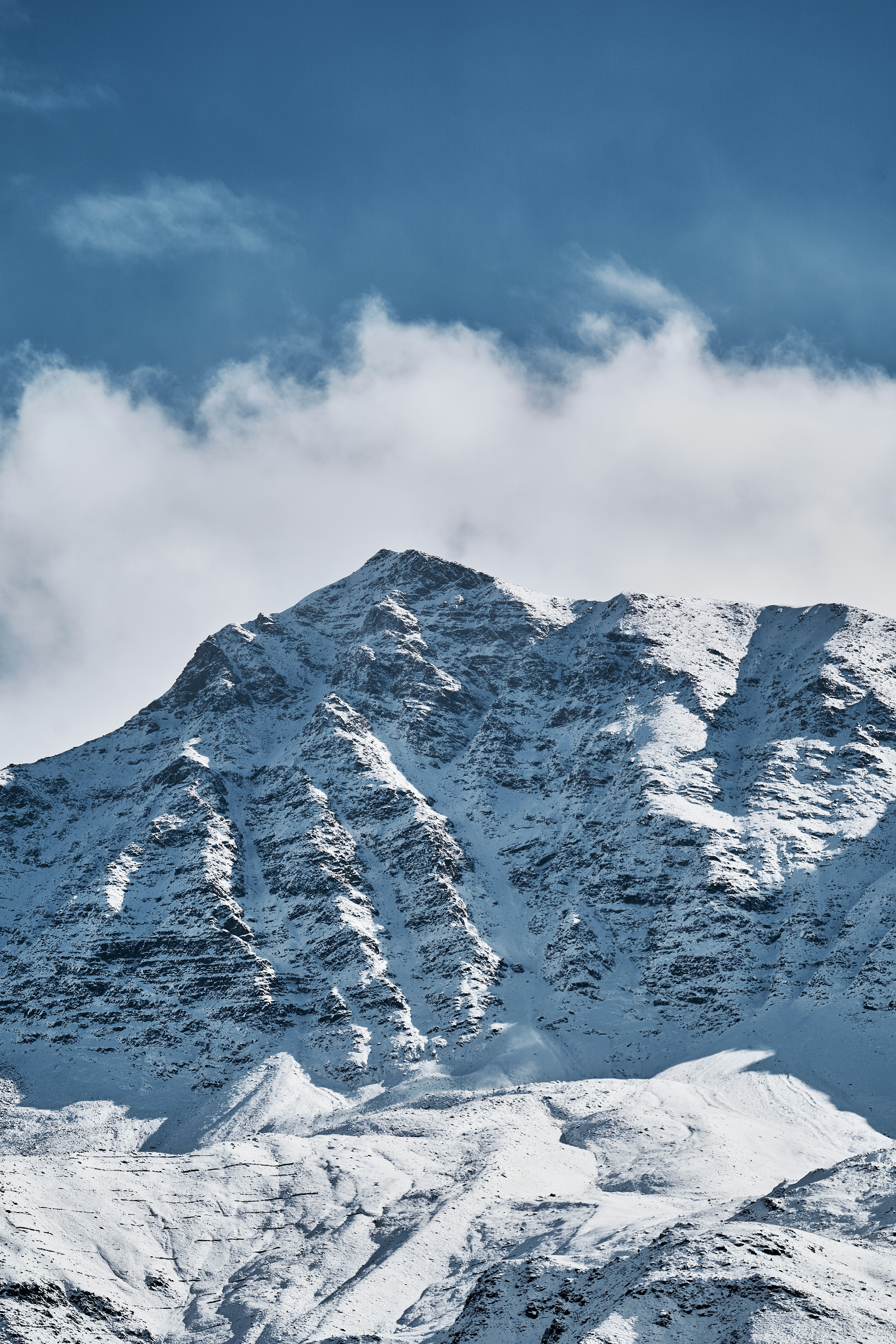 Snow-Crowned Ridge Beneath a Clear Alpine Sky