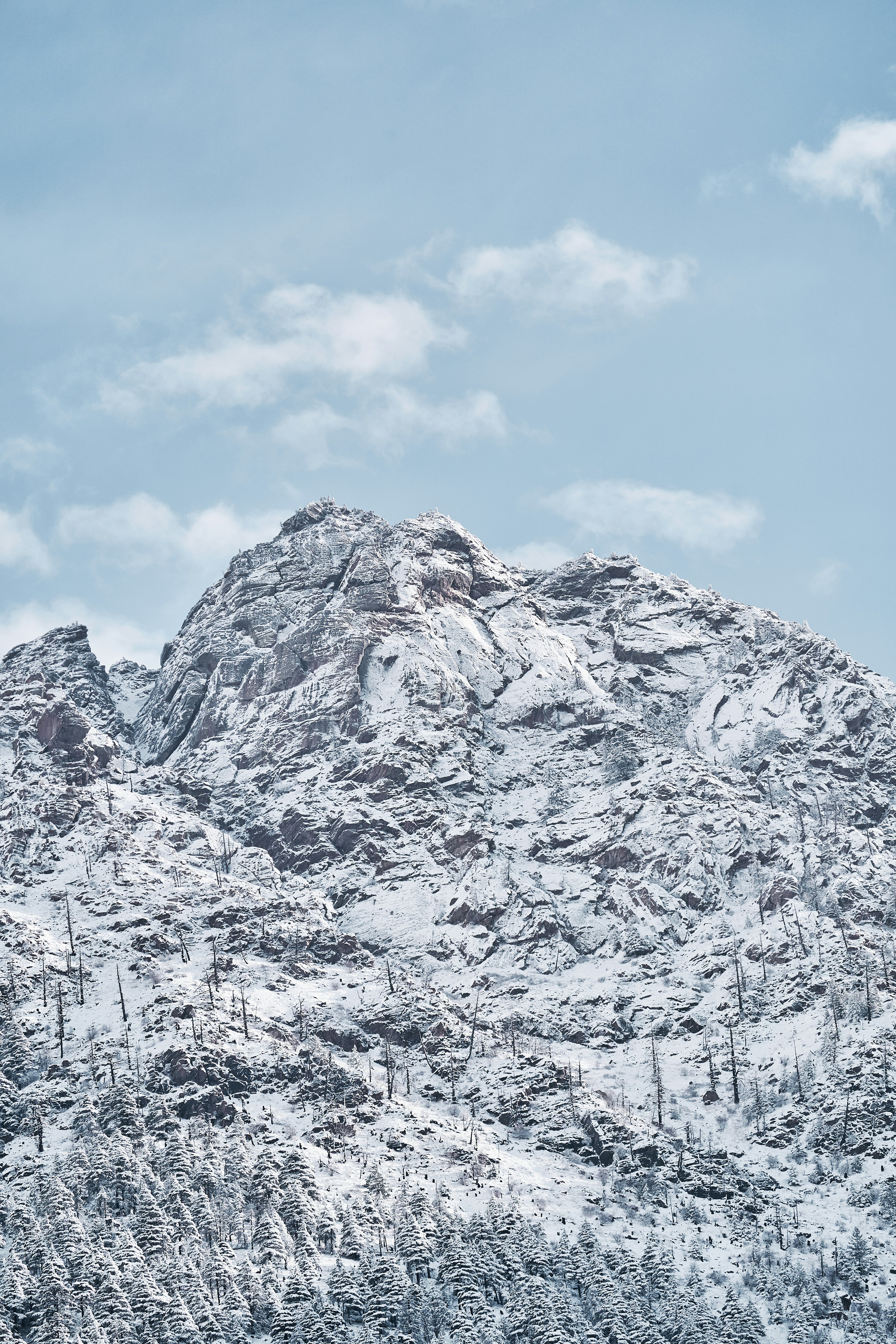 Snow-kissed Ridge Under a Clear Alpine Sky