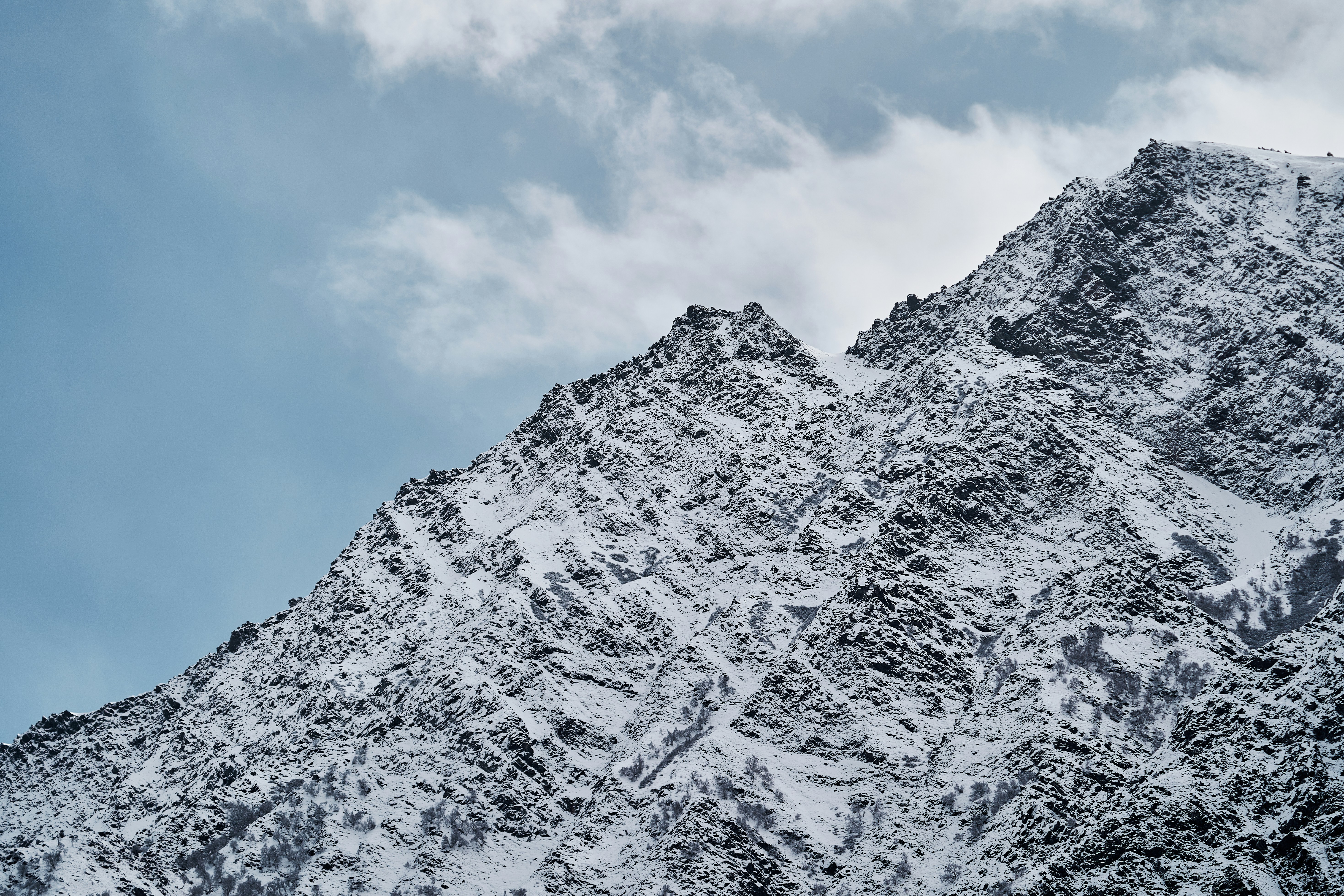 Snowbound Ridge Under a Clear Alpine Sky