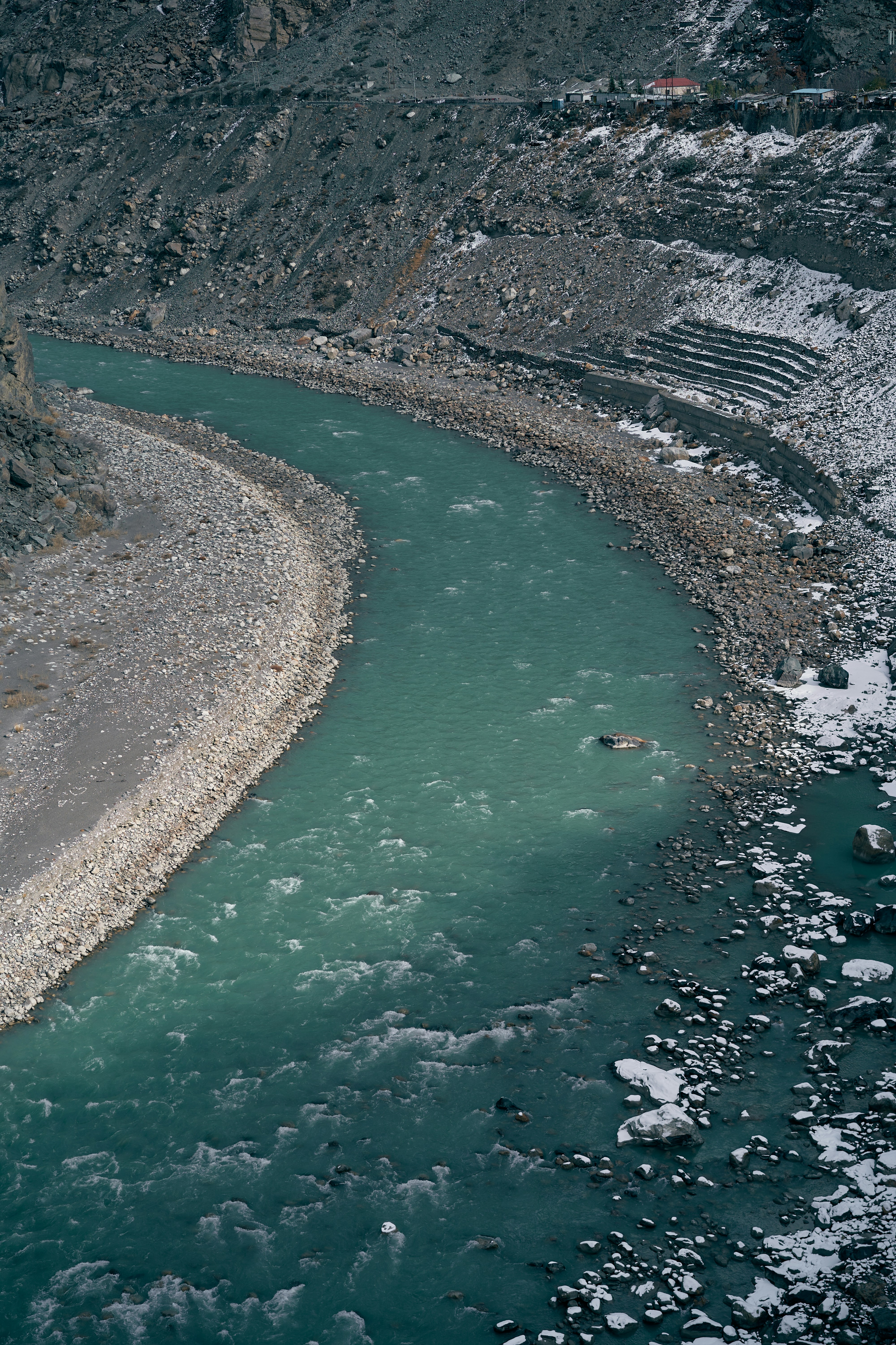 Turquoise River Bend Through Snow-dusted Gorge