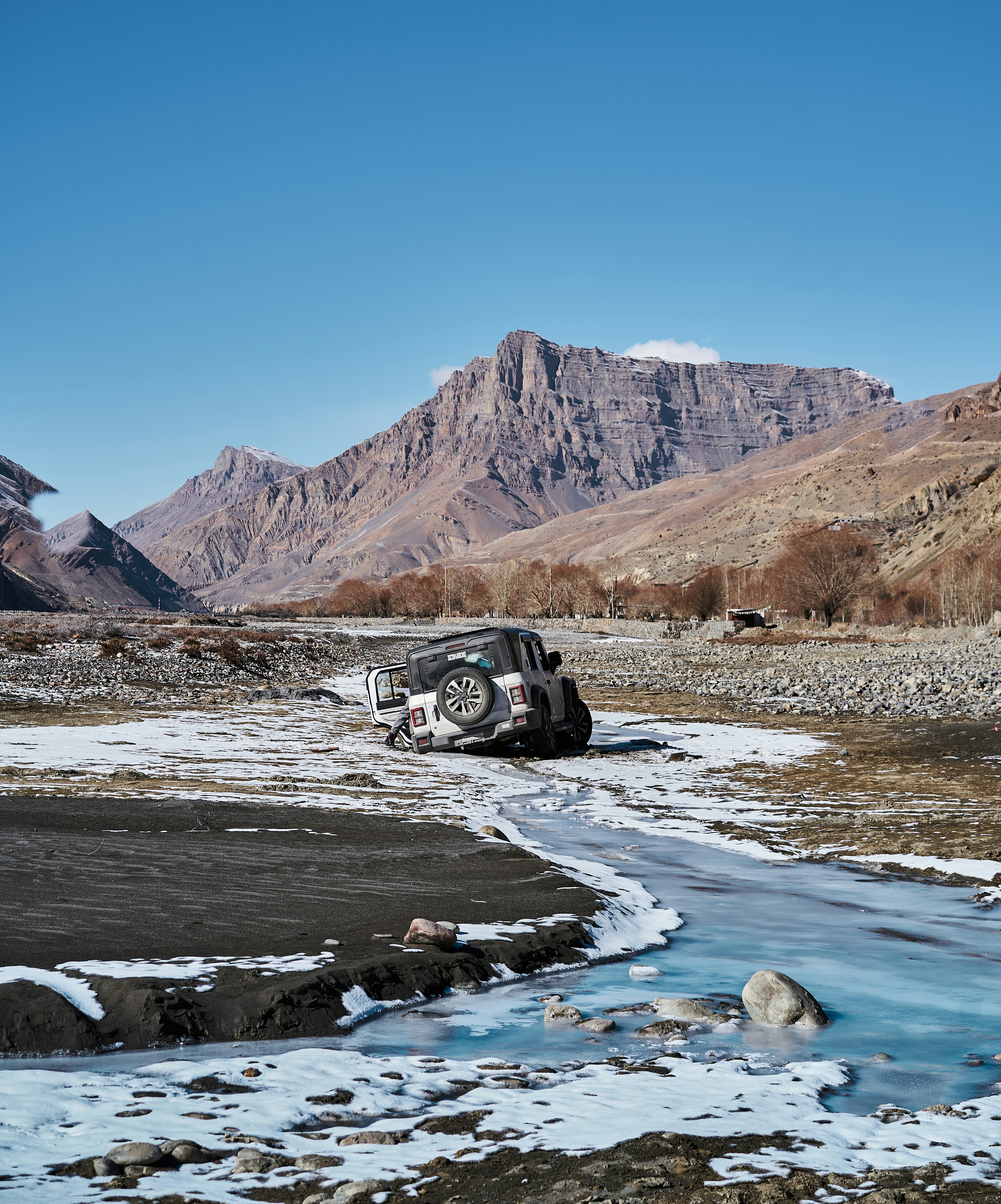 Jeep Trek: Ice Creek Crossing Under Rugged Canyon