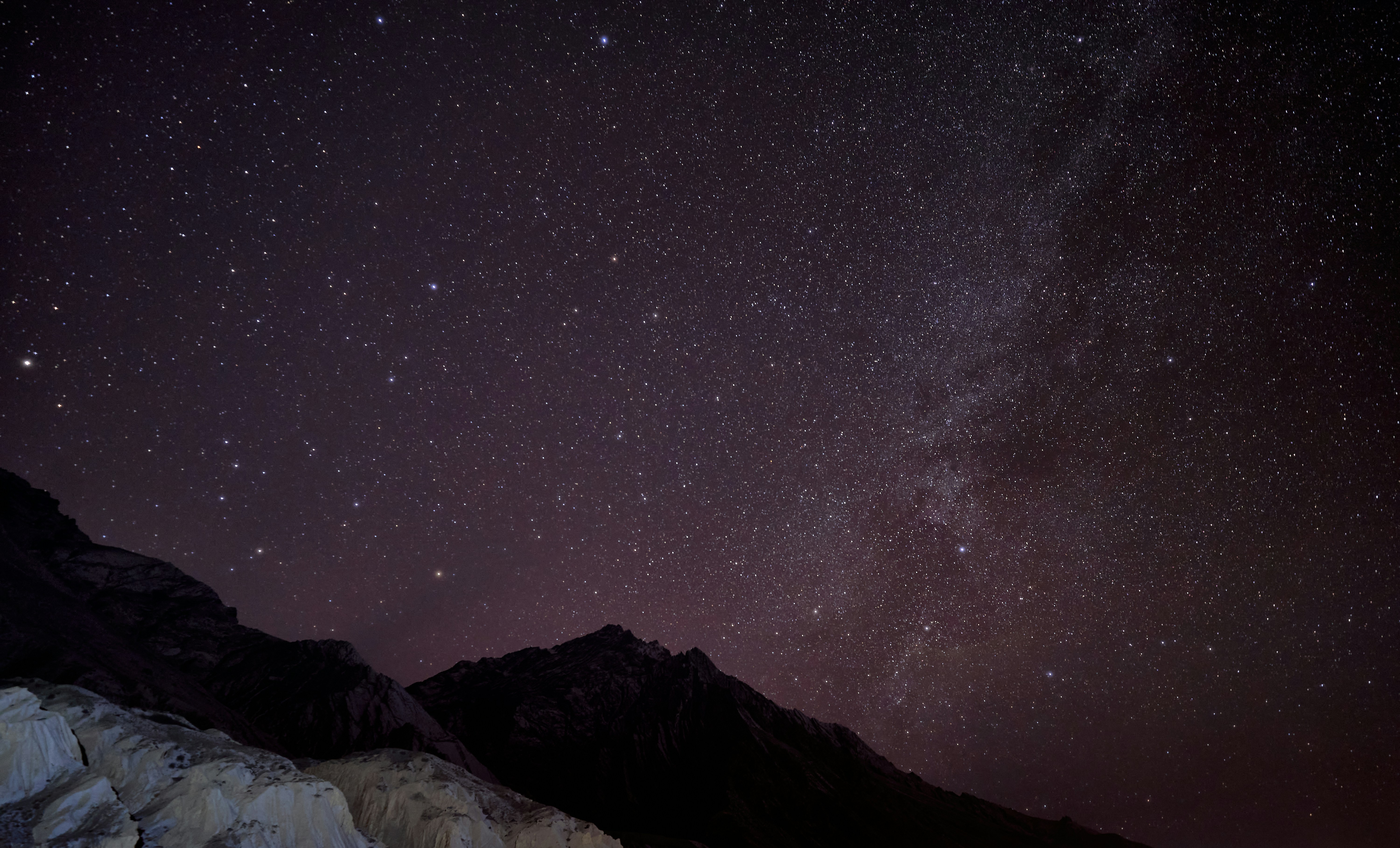 Milky Way Trail Above Silhouetted Peaks