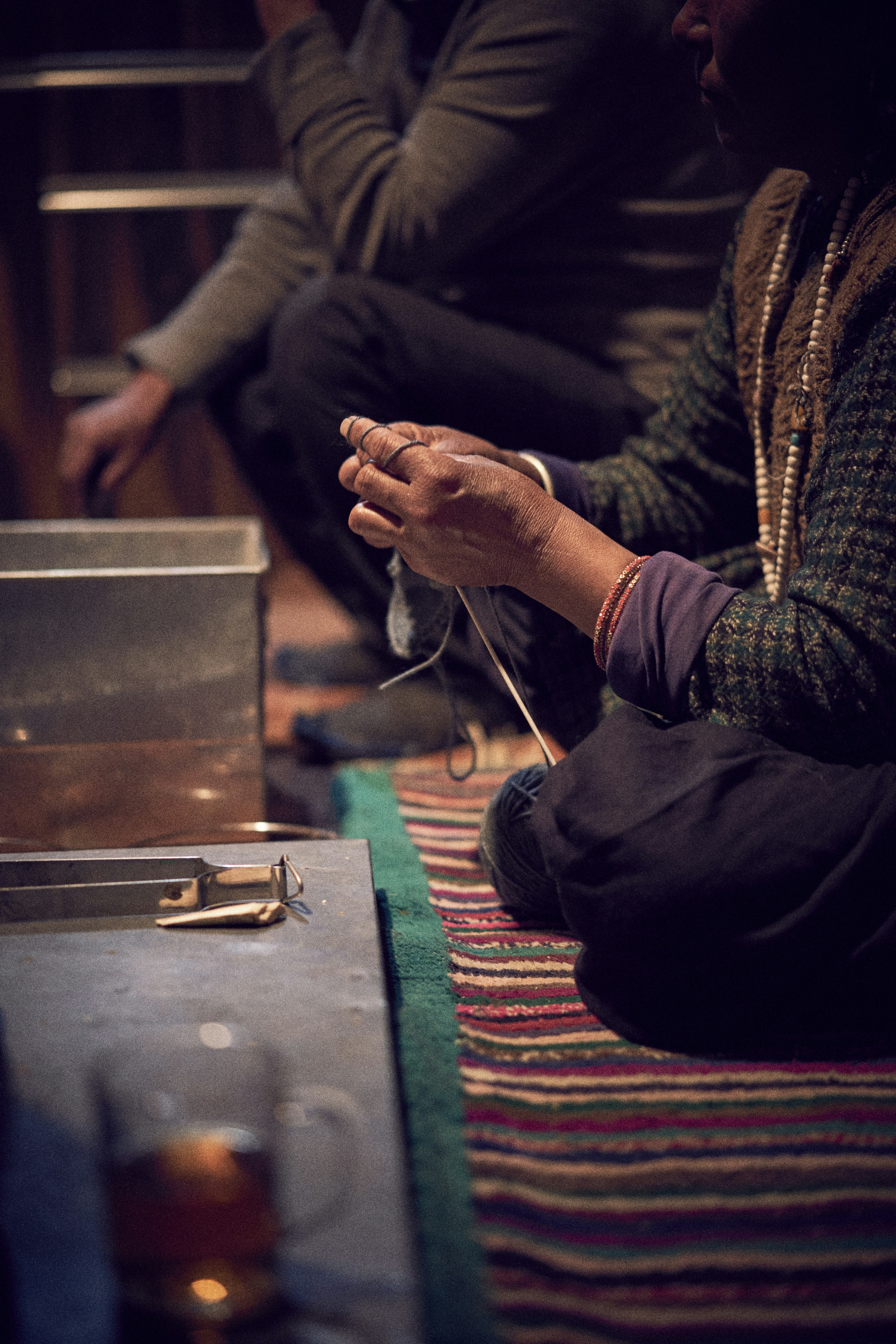 Hands and Threadwork by the Firelight