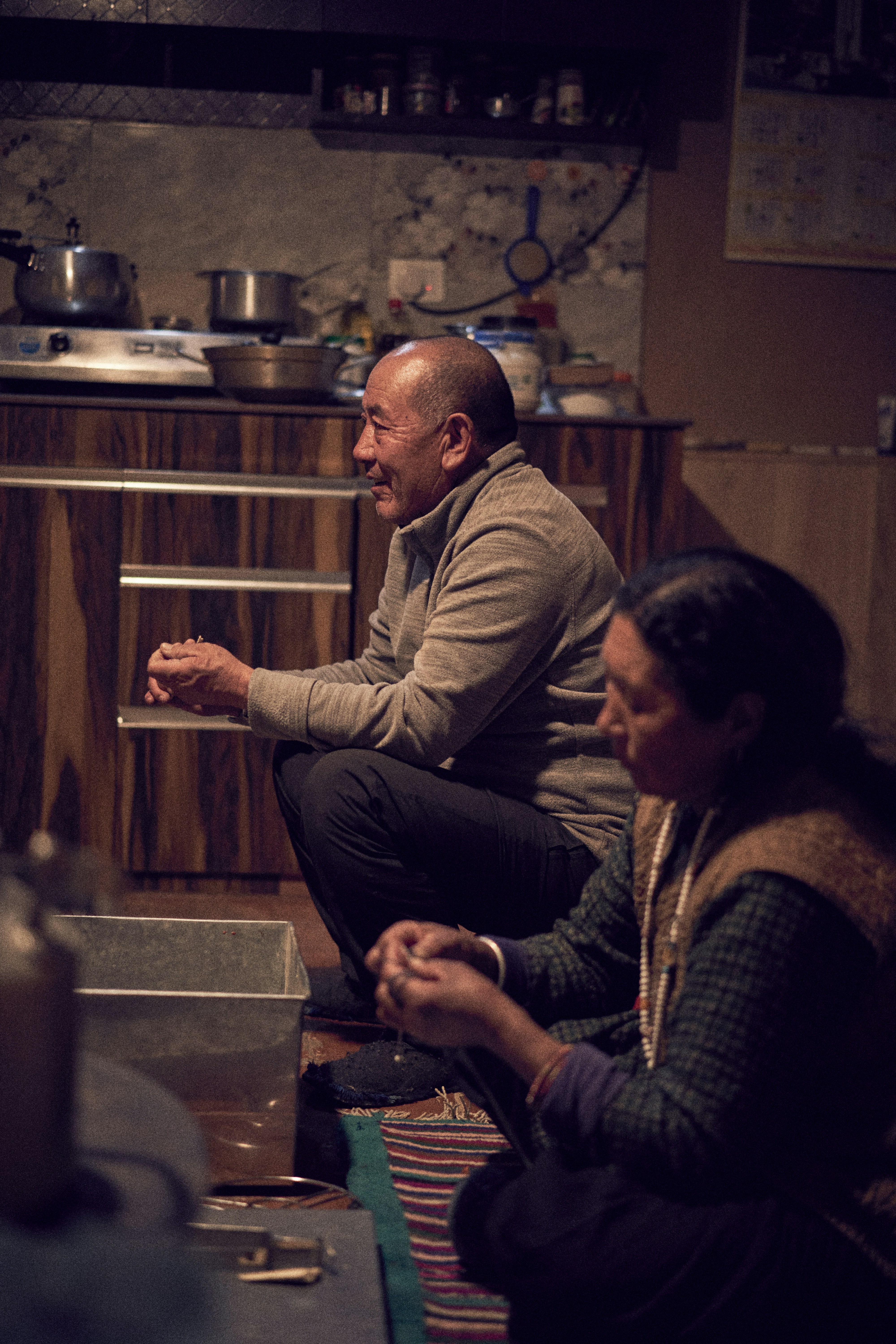 Quiet Contemplation by the Stove: A Moment in the Kitchen