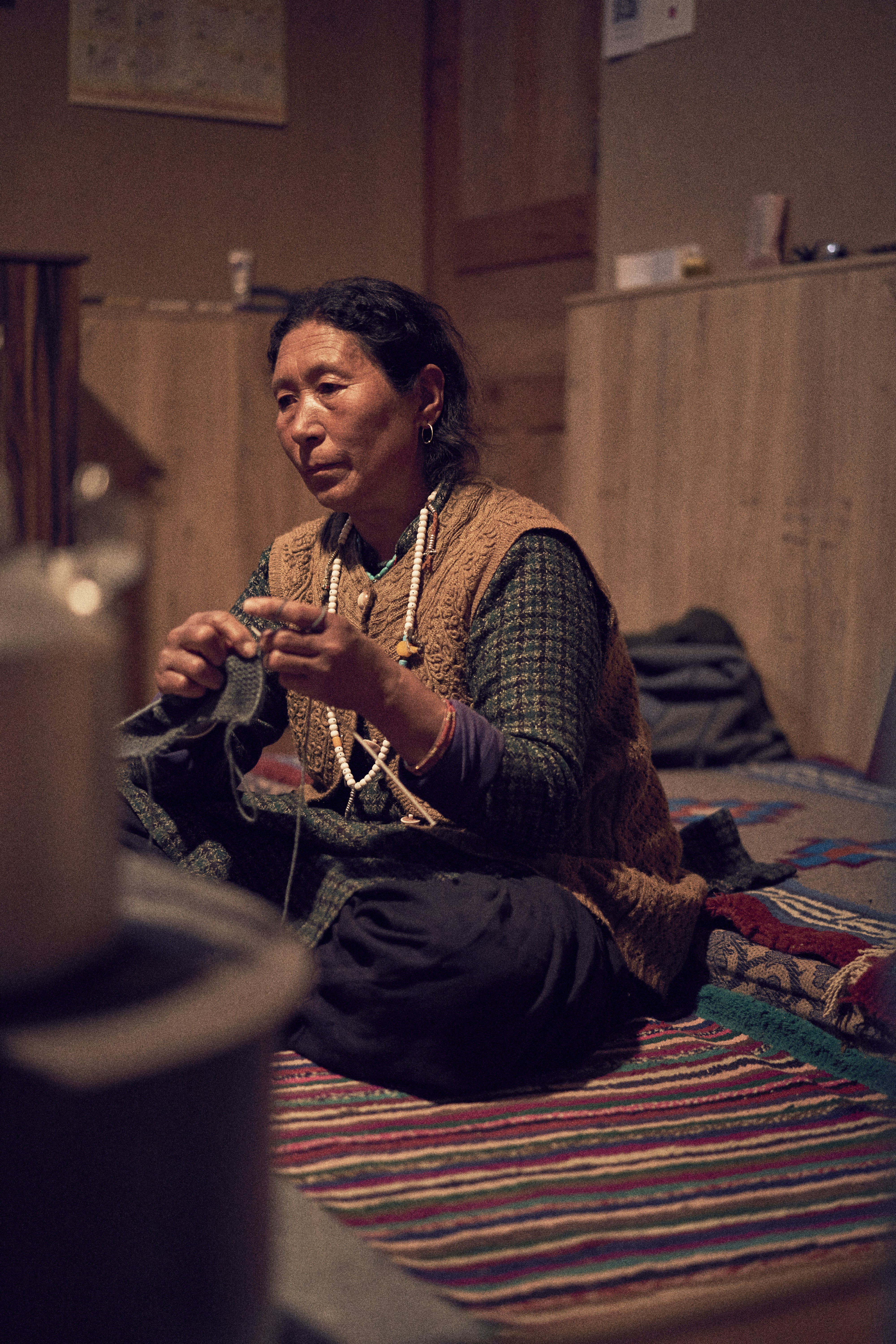 Weaving Quiet Time: A Woman Knit by Lamplight