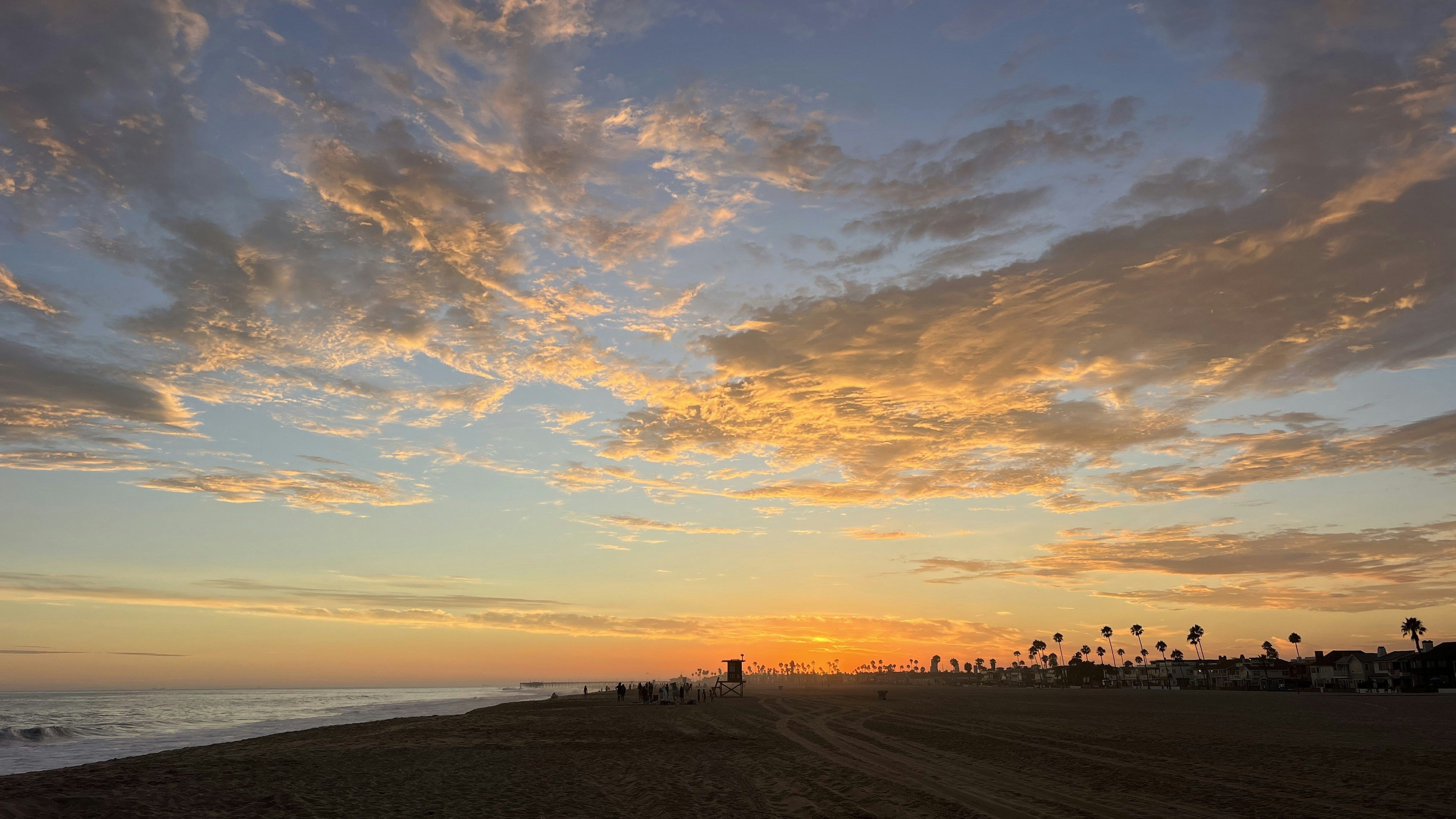 Sunset Boulevard: Horizon Fire Over a Quiet Beach