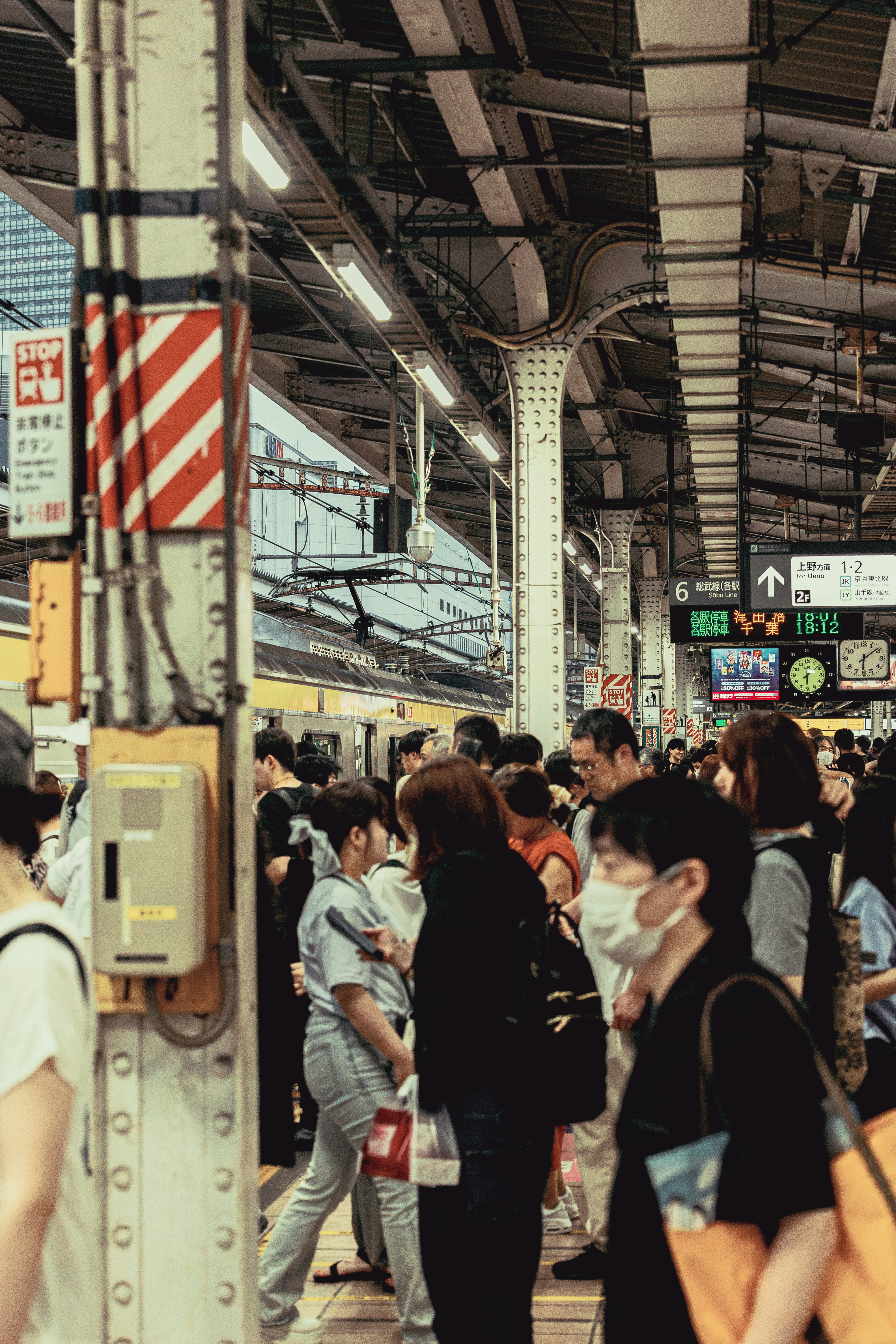 Platform Pulse: Crowded Tokyo Station Confluence