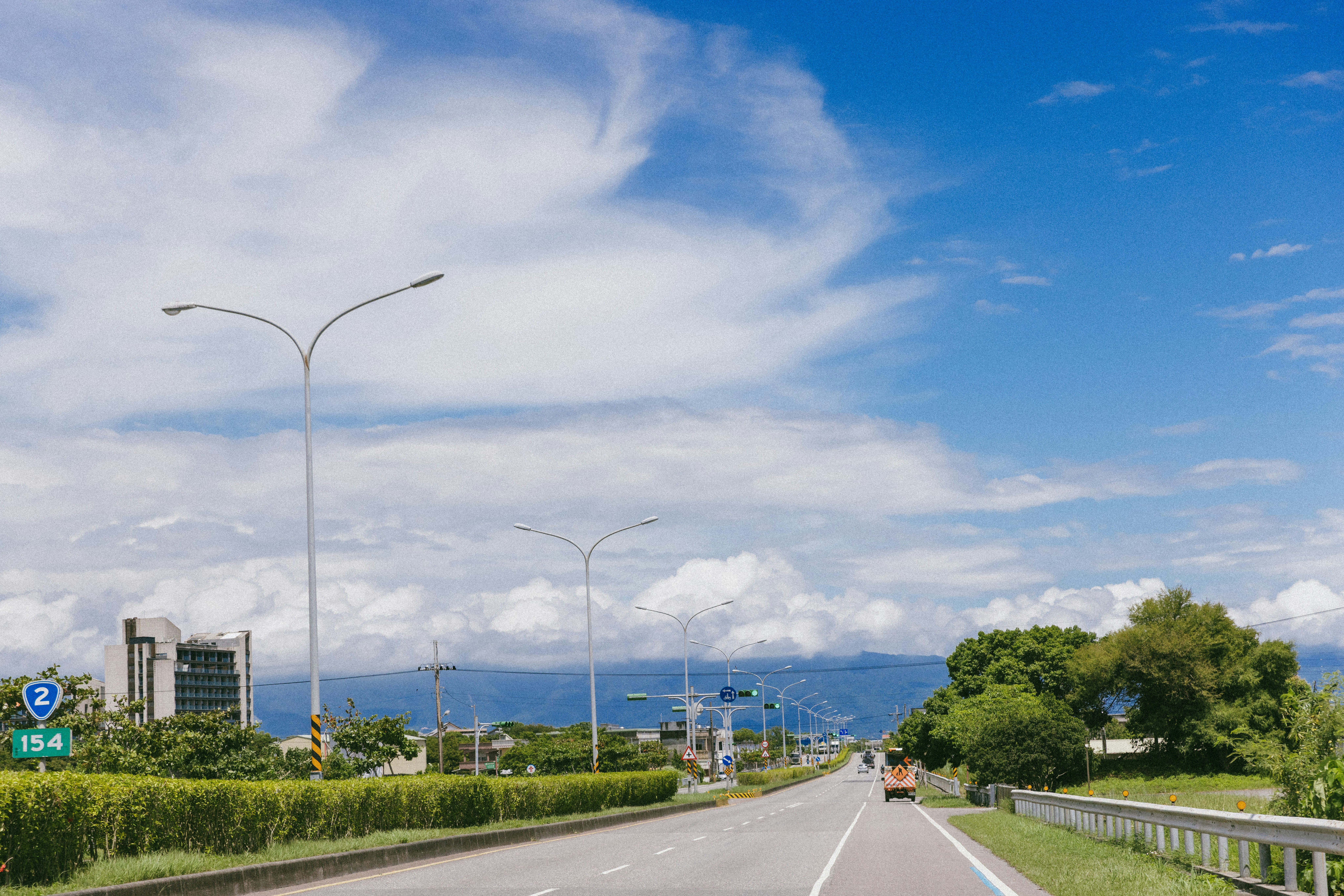 Open Highway Under a Vast Sky