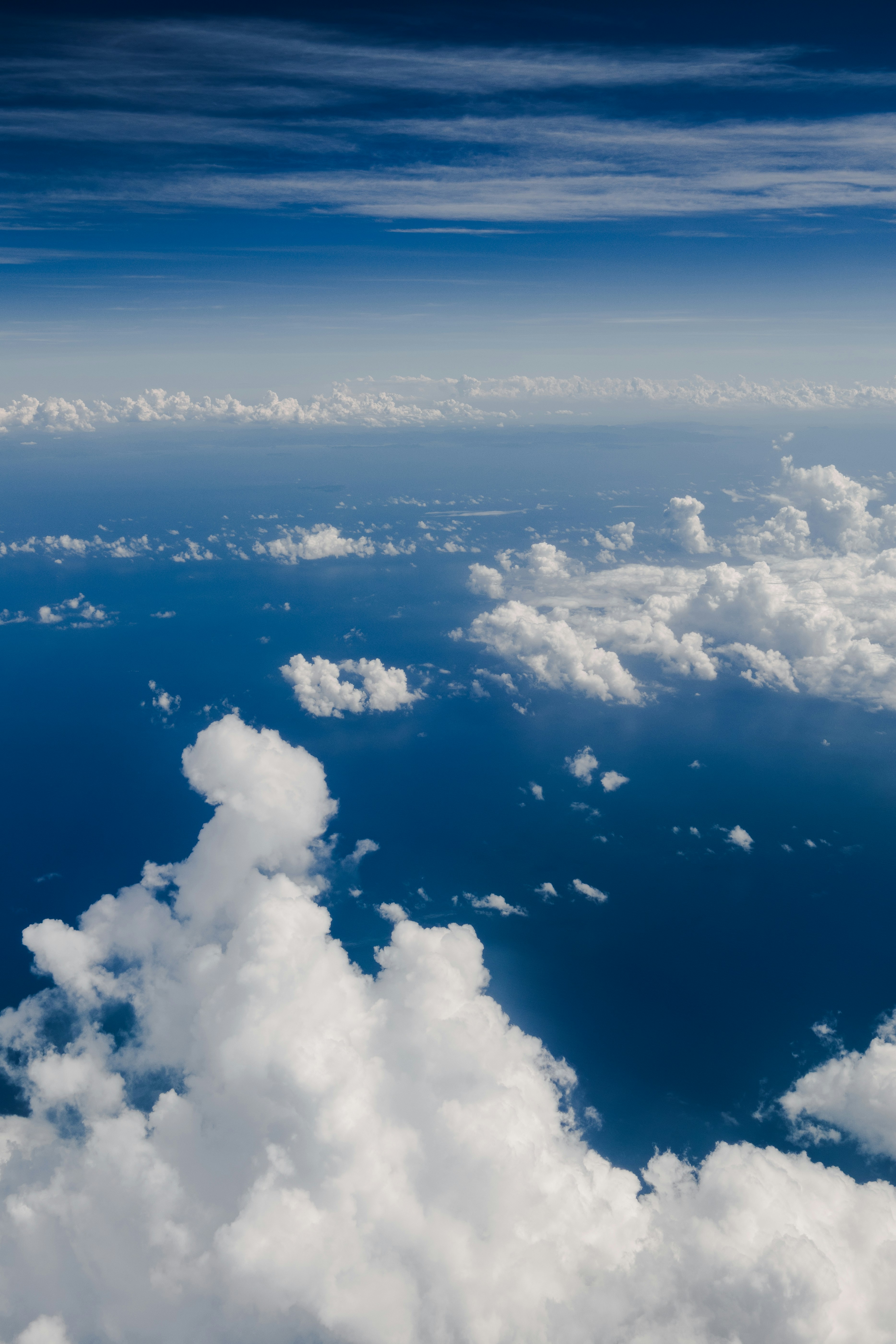 Above the World: A Vast Sea of Clouds under a Velvet Sky