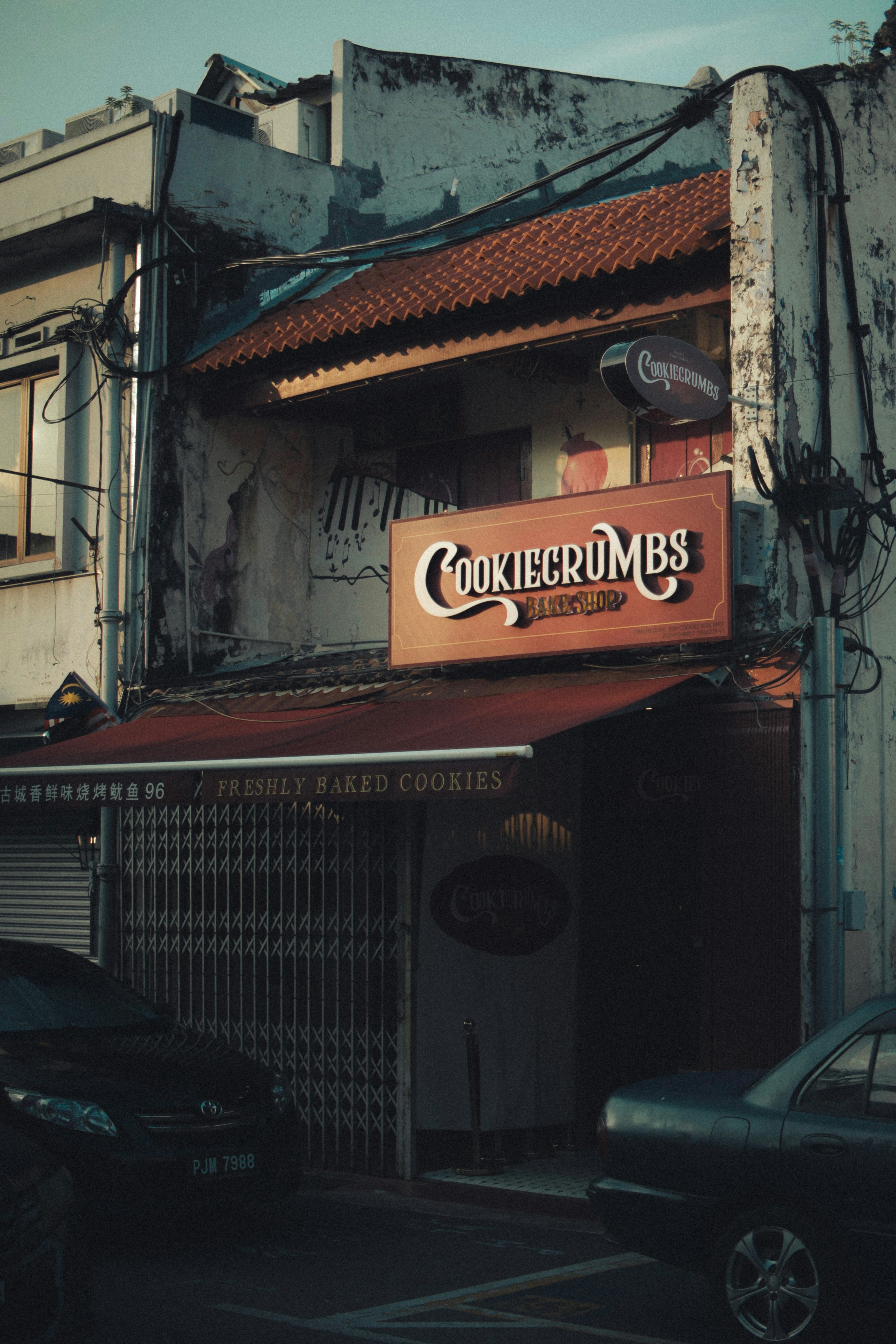 Cookie Crumbs: Neon Signage and Echoes of a Tiny Shopfront