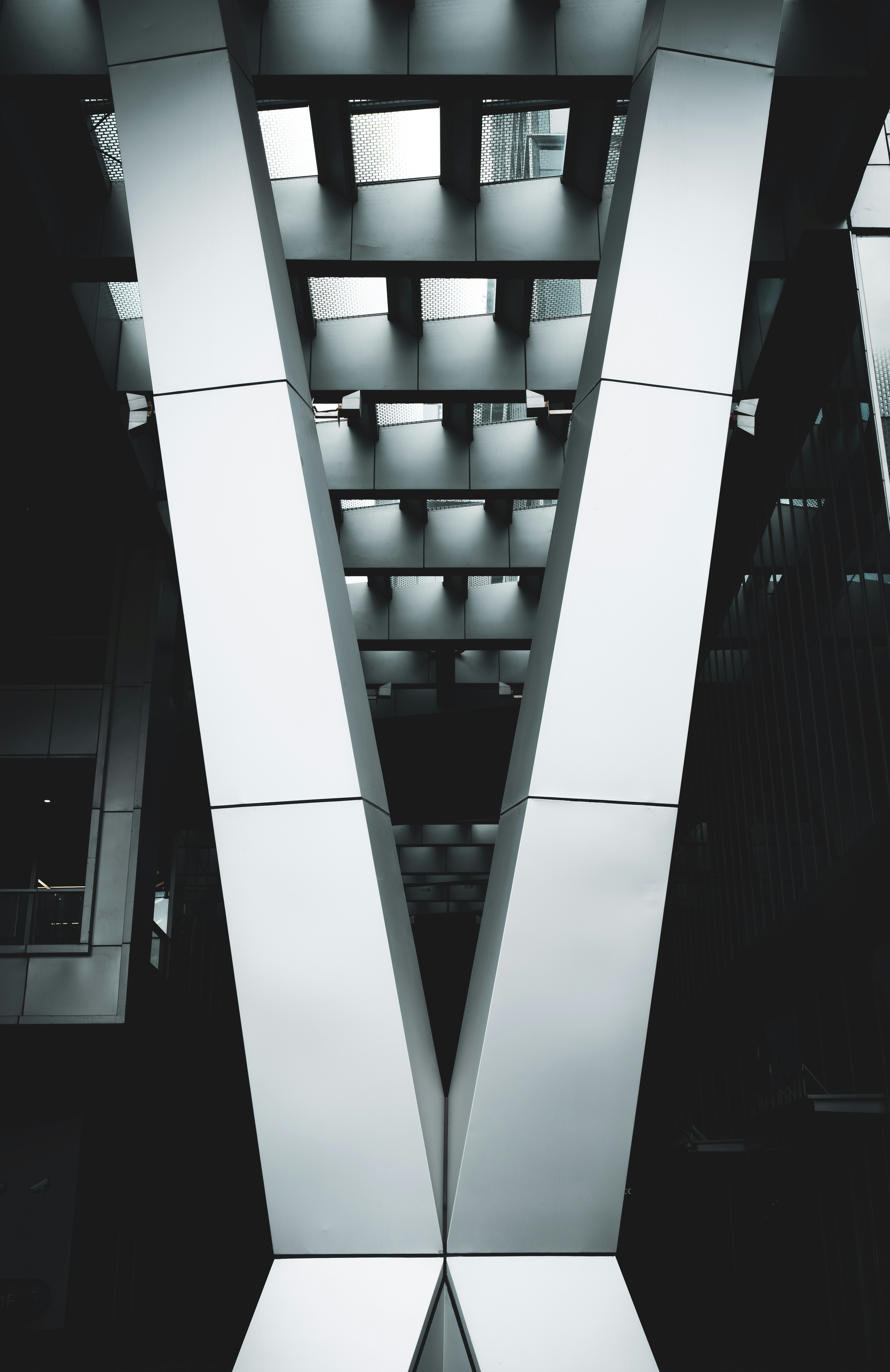 Architectural Convergence: The V‑Shaped Frame Intrudes the Void