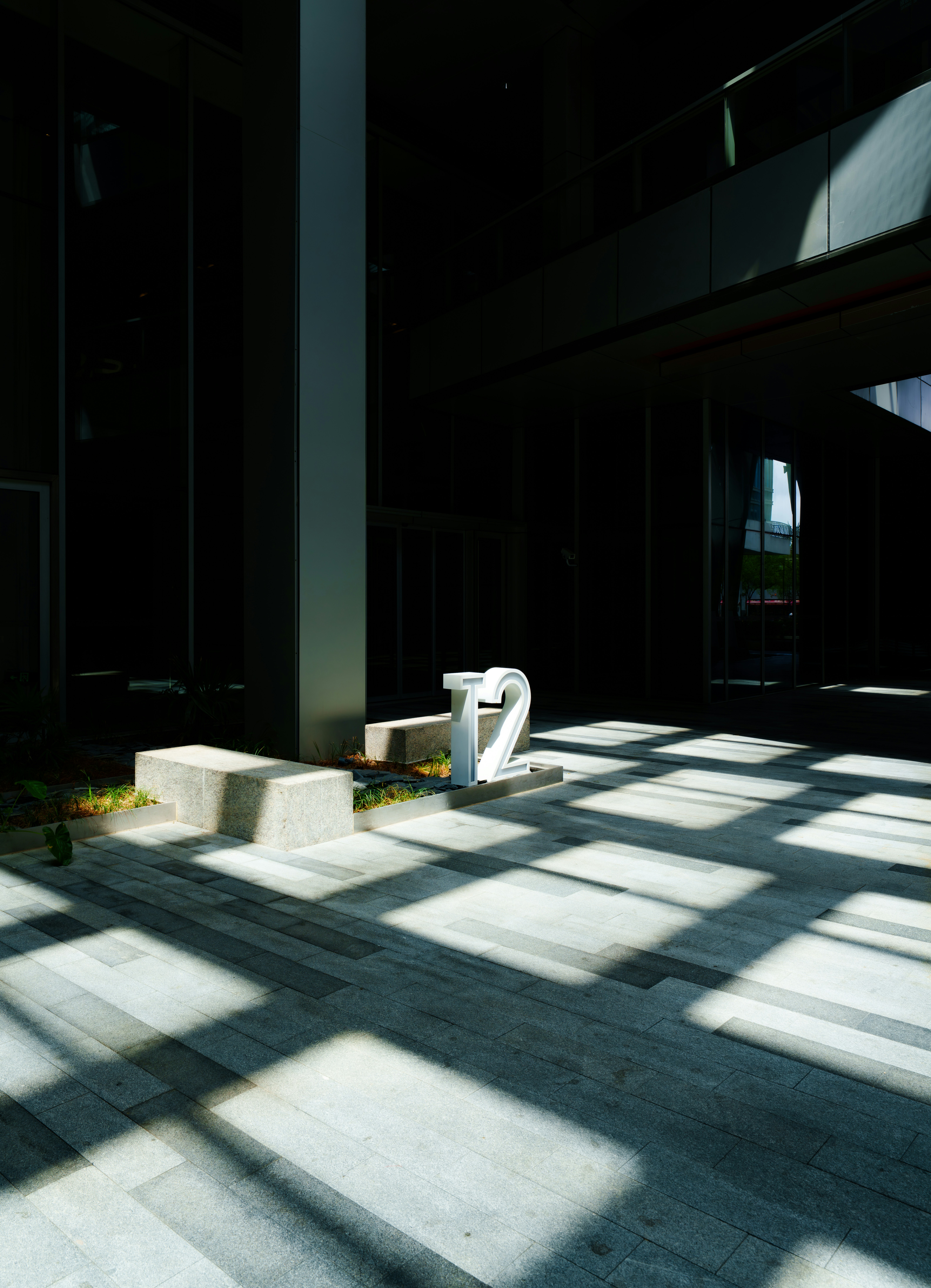 Concrete Shadows and the Number 12