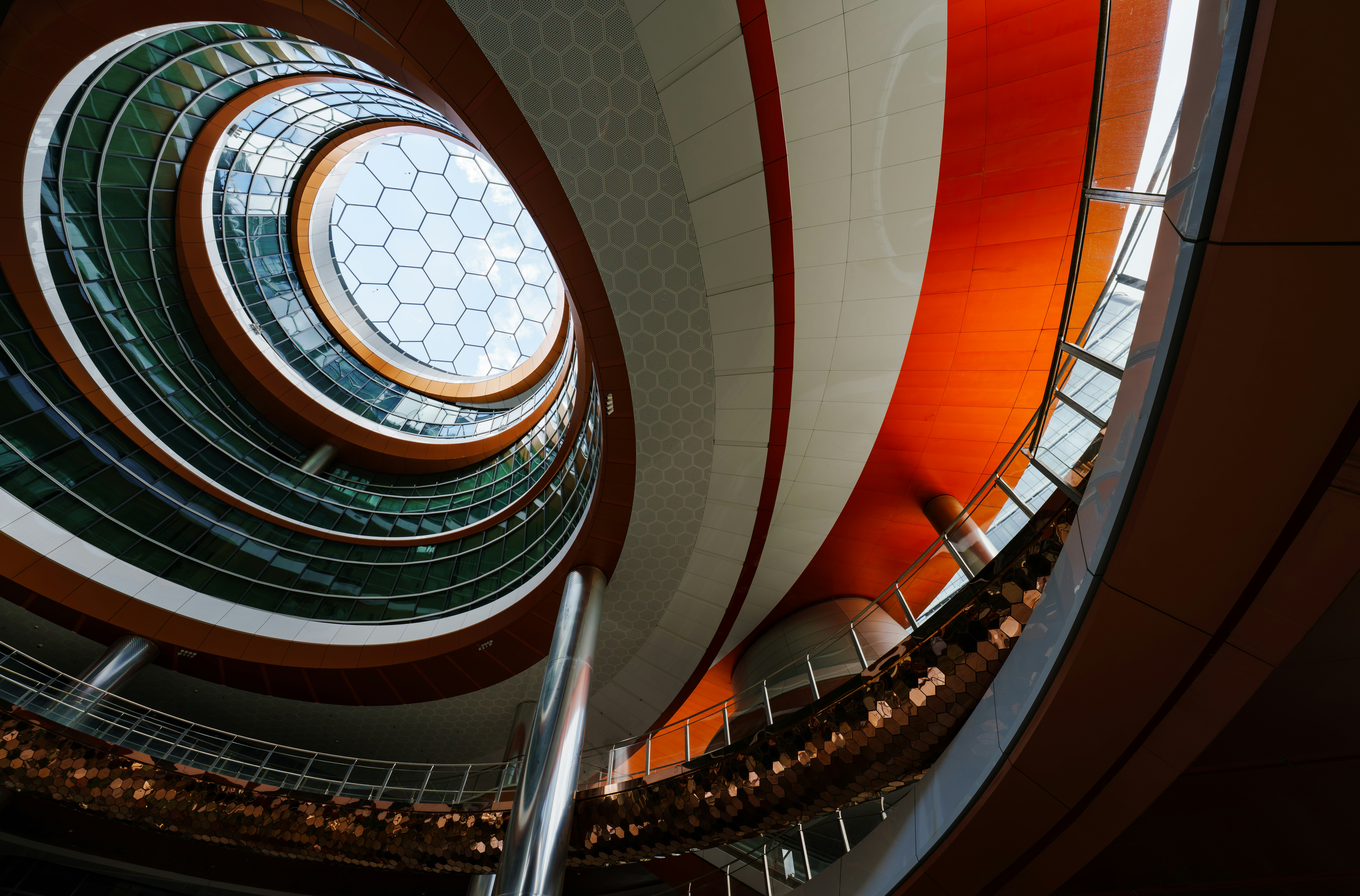 Spiral Atrium: Concentric Curves of Color and Glass