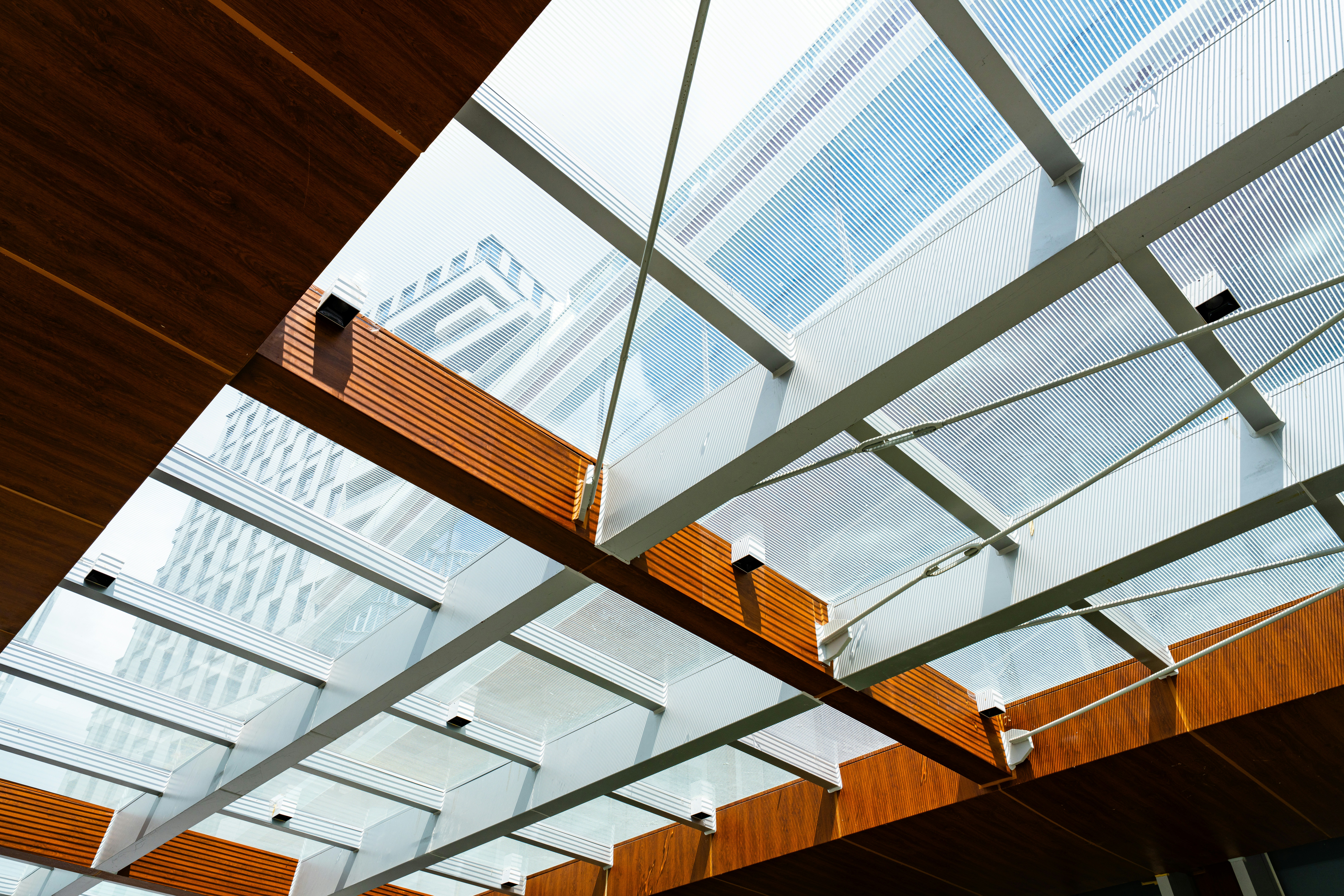 Glazed Geometry: Steel Beams and Sunlit Glass in a Modern Atrium