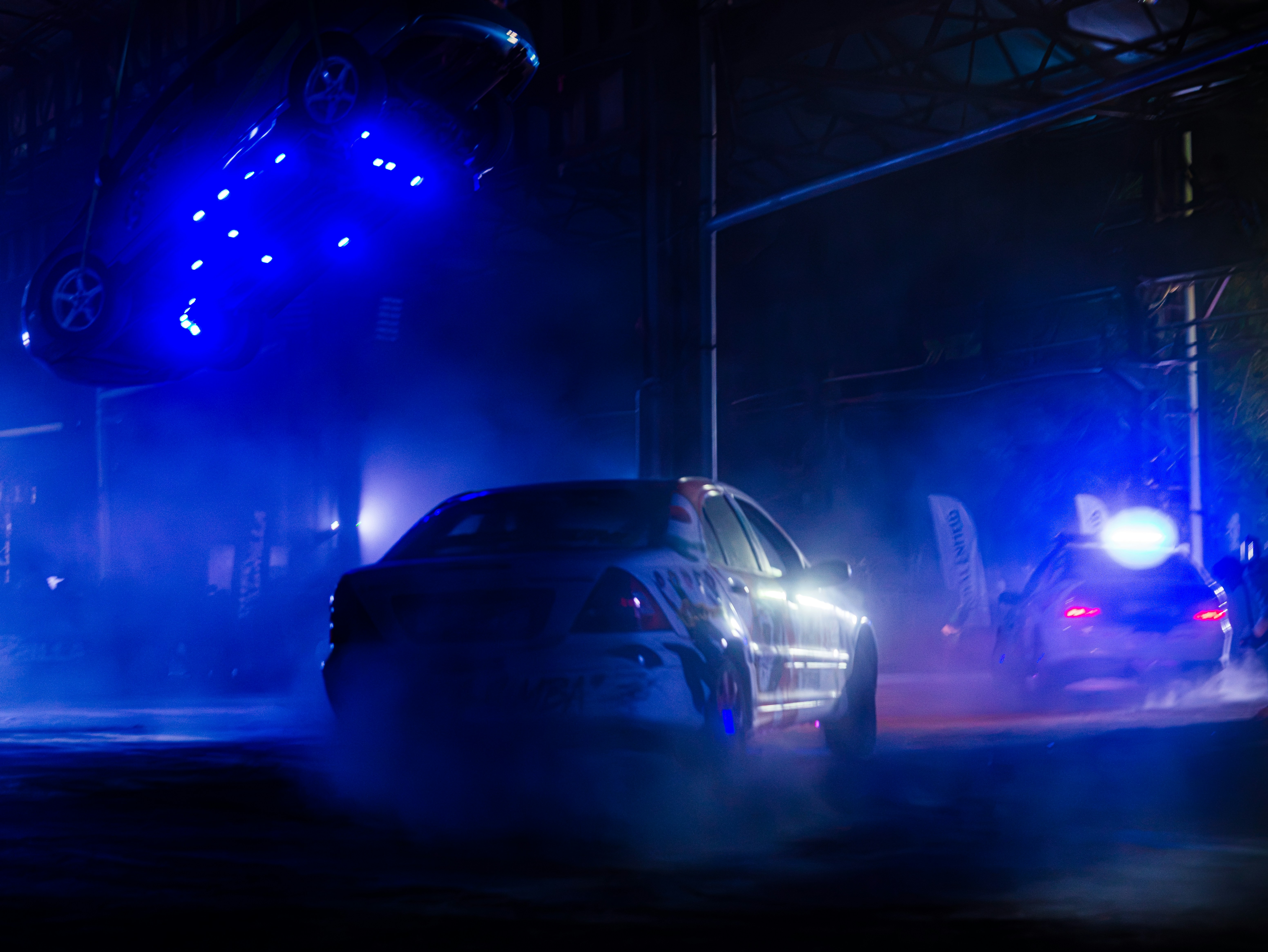 Neo-Bluedrift: Neon-Lit Drift Car in Midnight Showroom