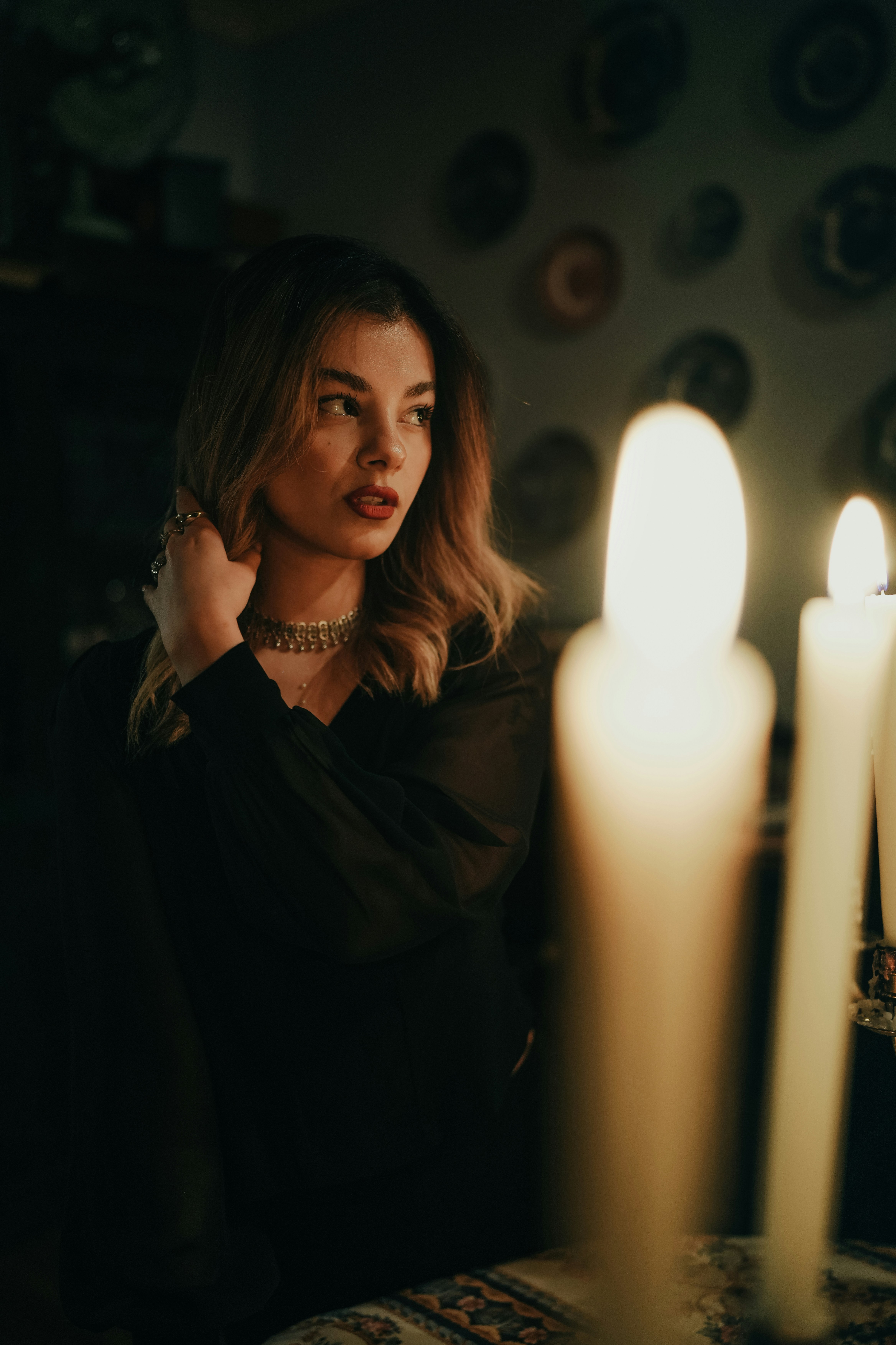 Candlelit Glimpse: A Quiet Portrait in Velvet Shadows