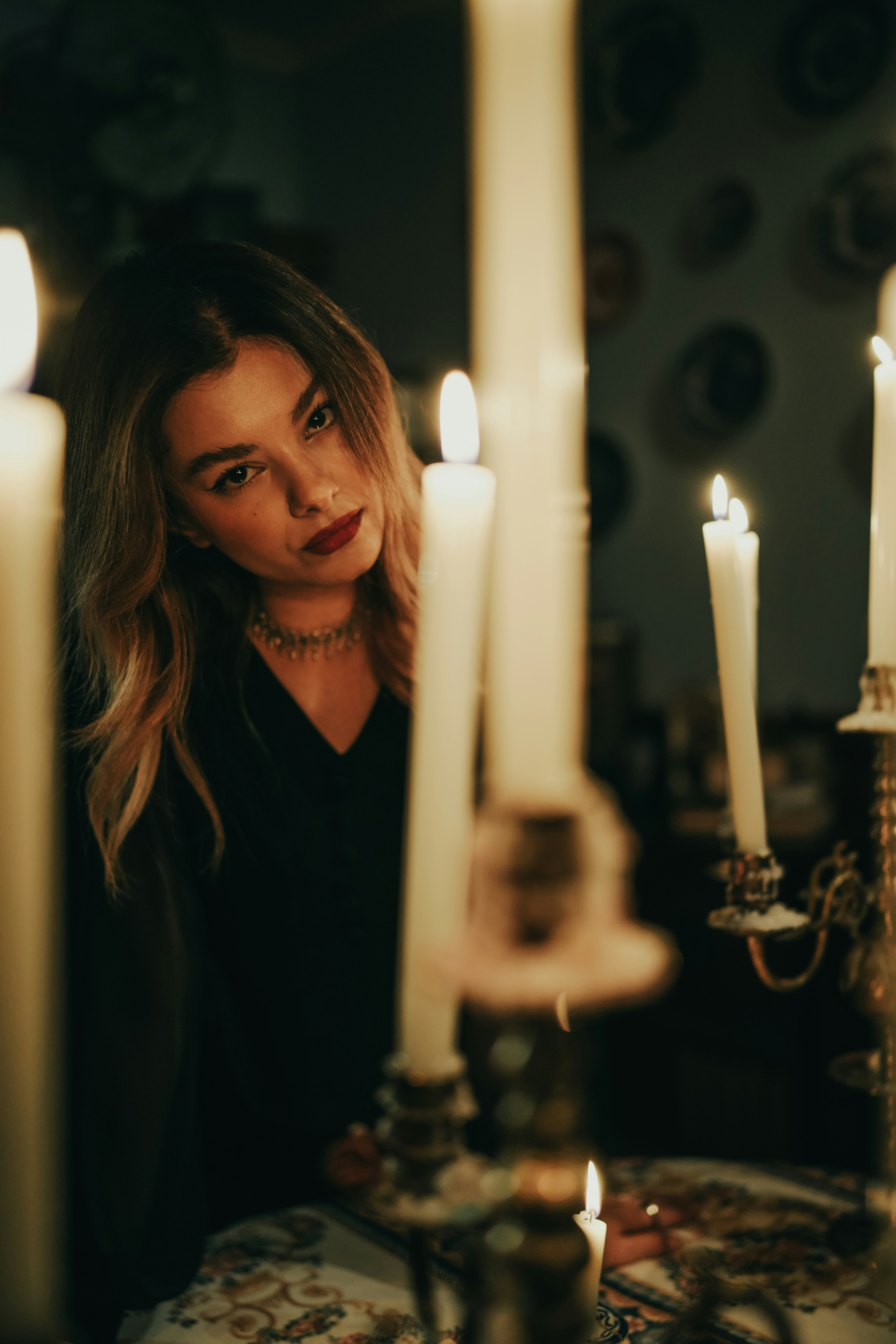 Candlelit Resolve: A gaze through warm flames