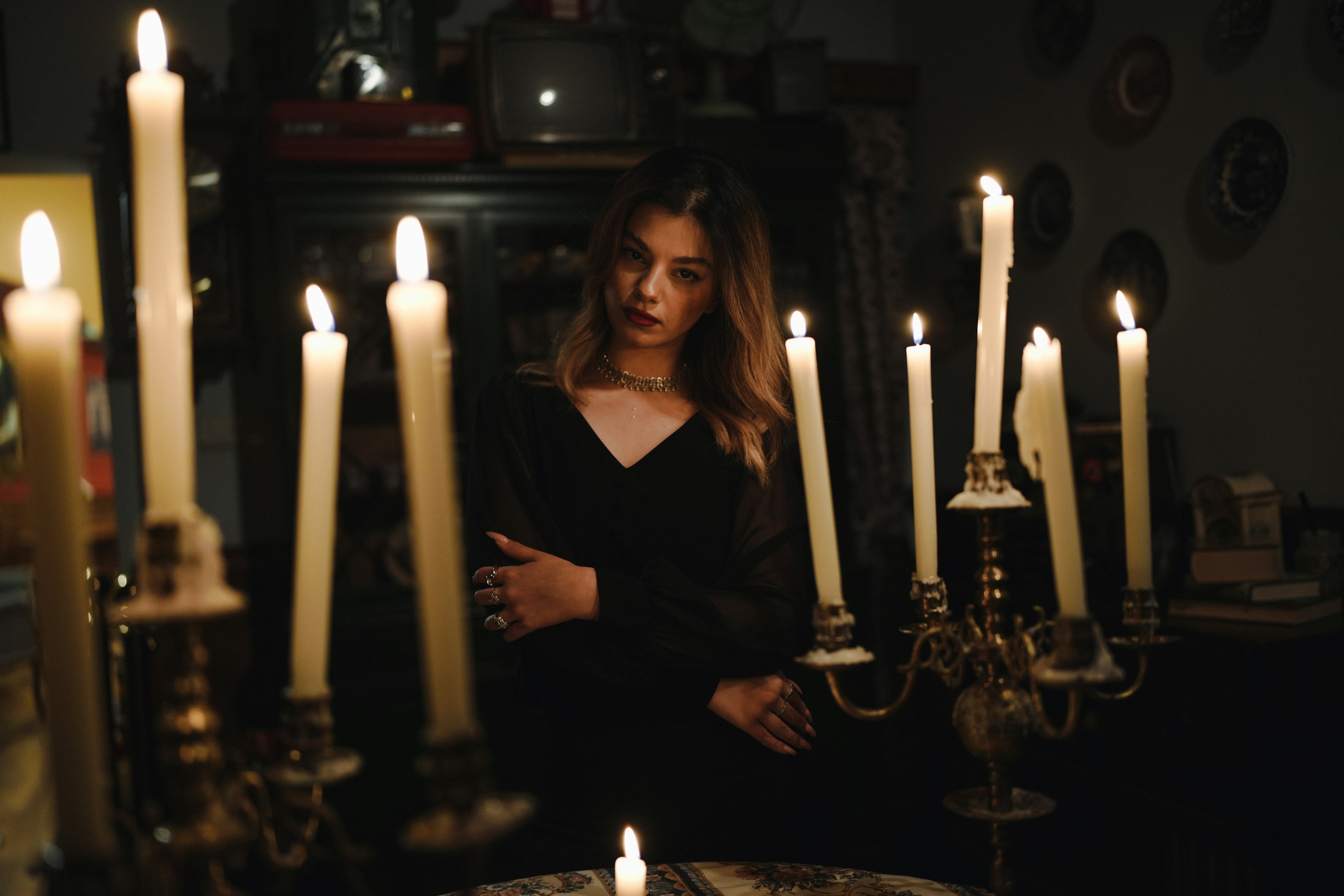 Candlelit Portrait: Quiet Intensity in a Velvet Room