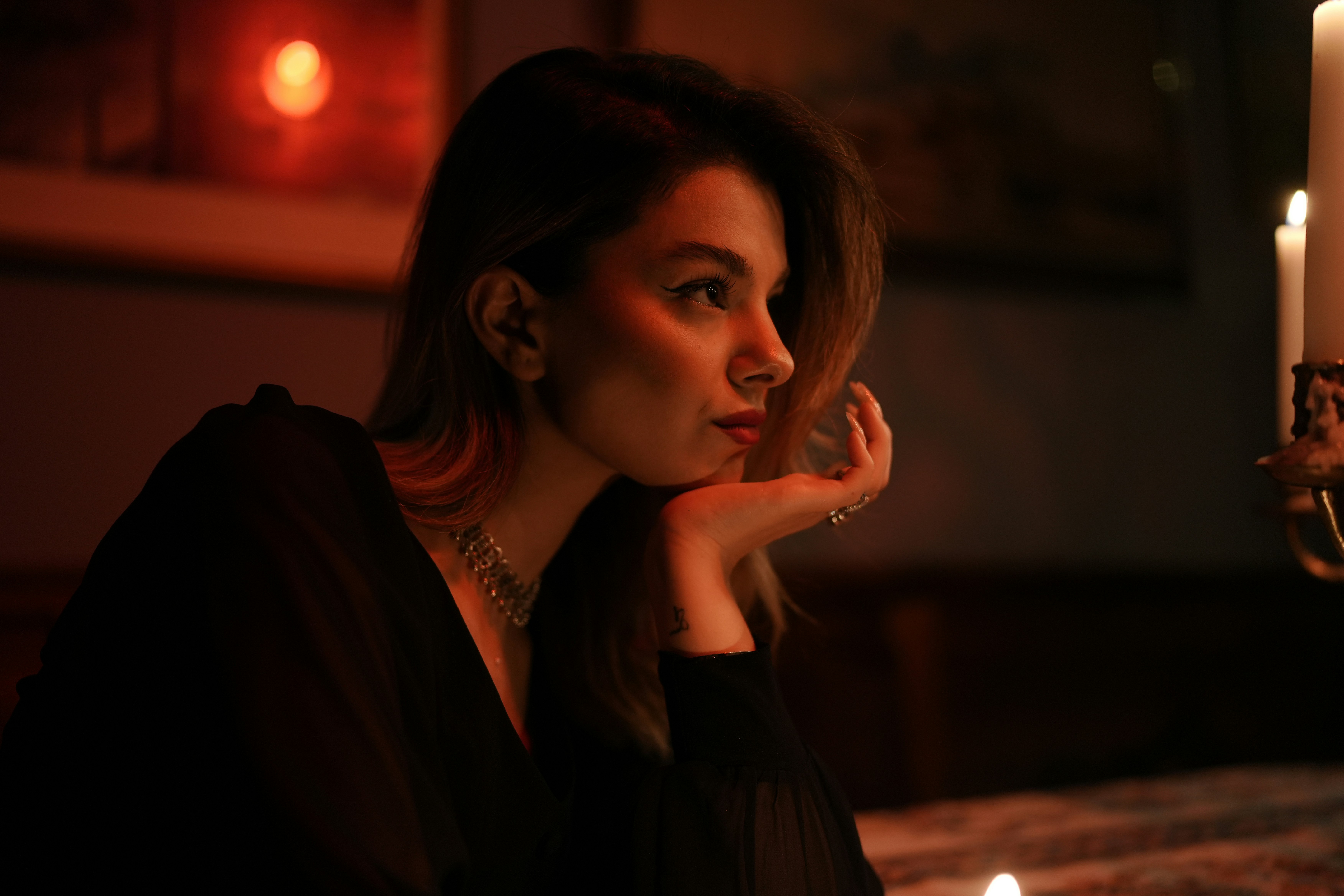 Moonlit Introspection: A Quiet Portrait by Candlelight