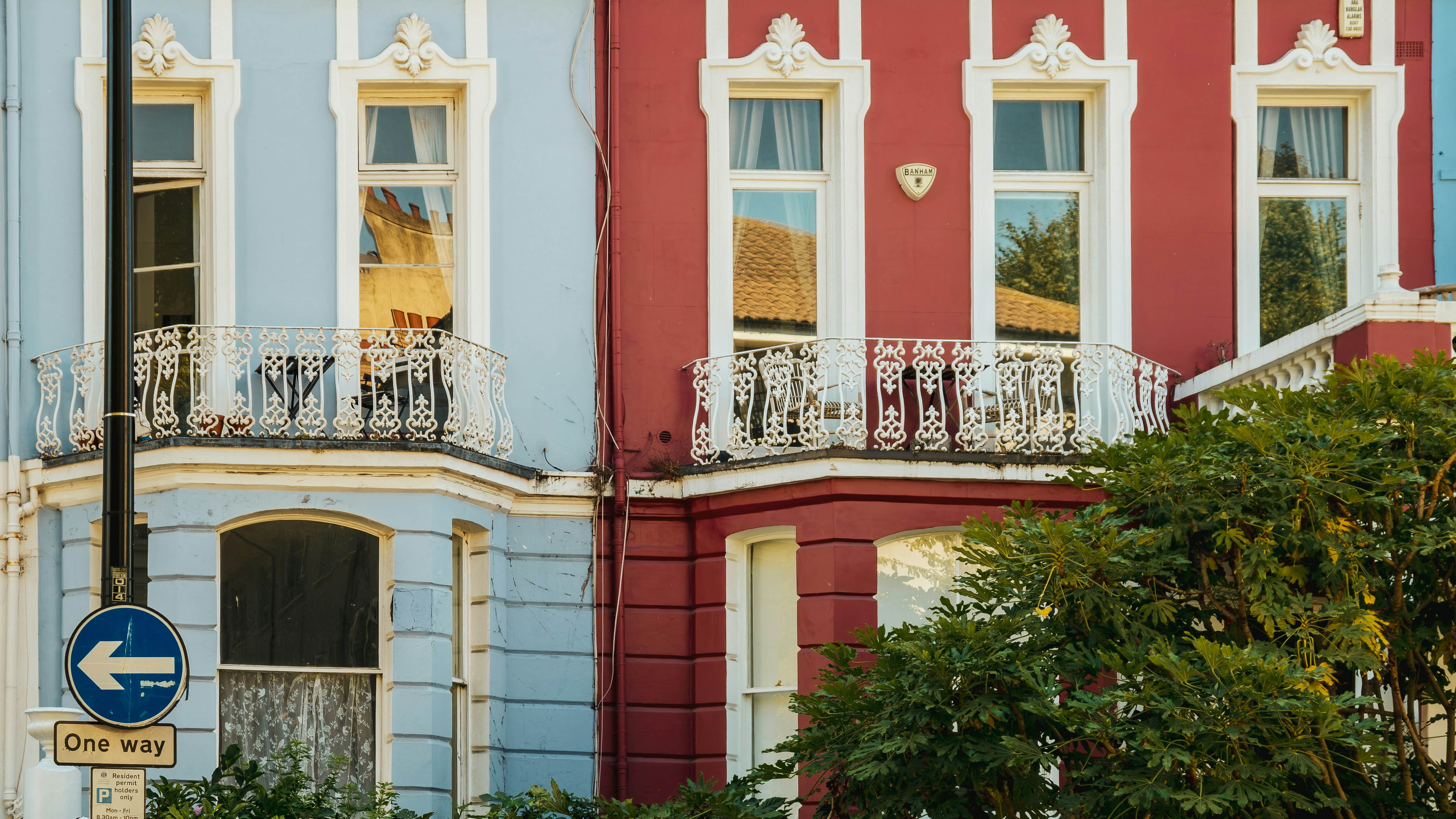 Color-Washed Facades: A Tale of Two Townhouses