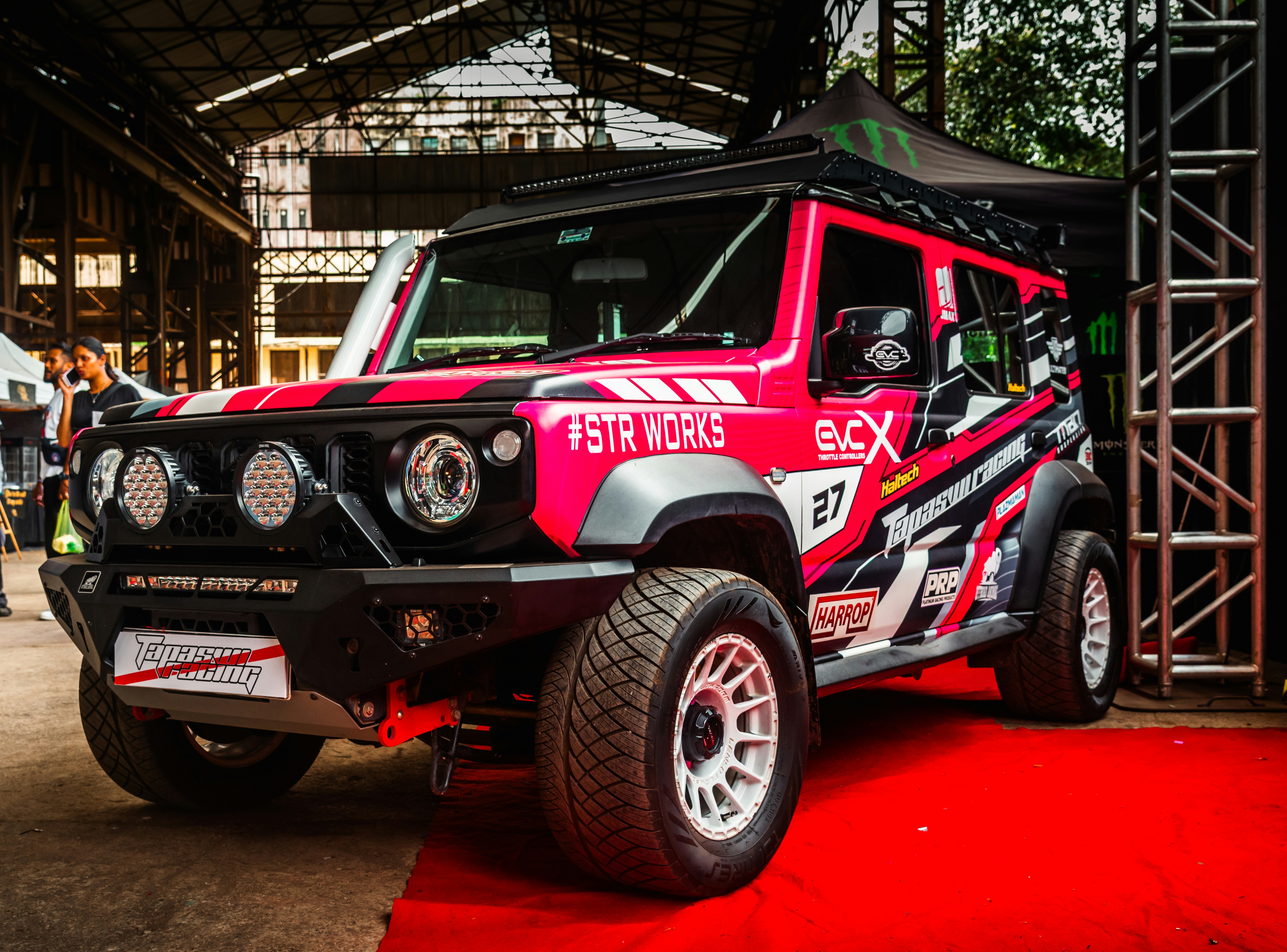 Red Rally Beast on a Crimson Carpet
