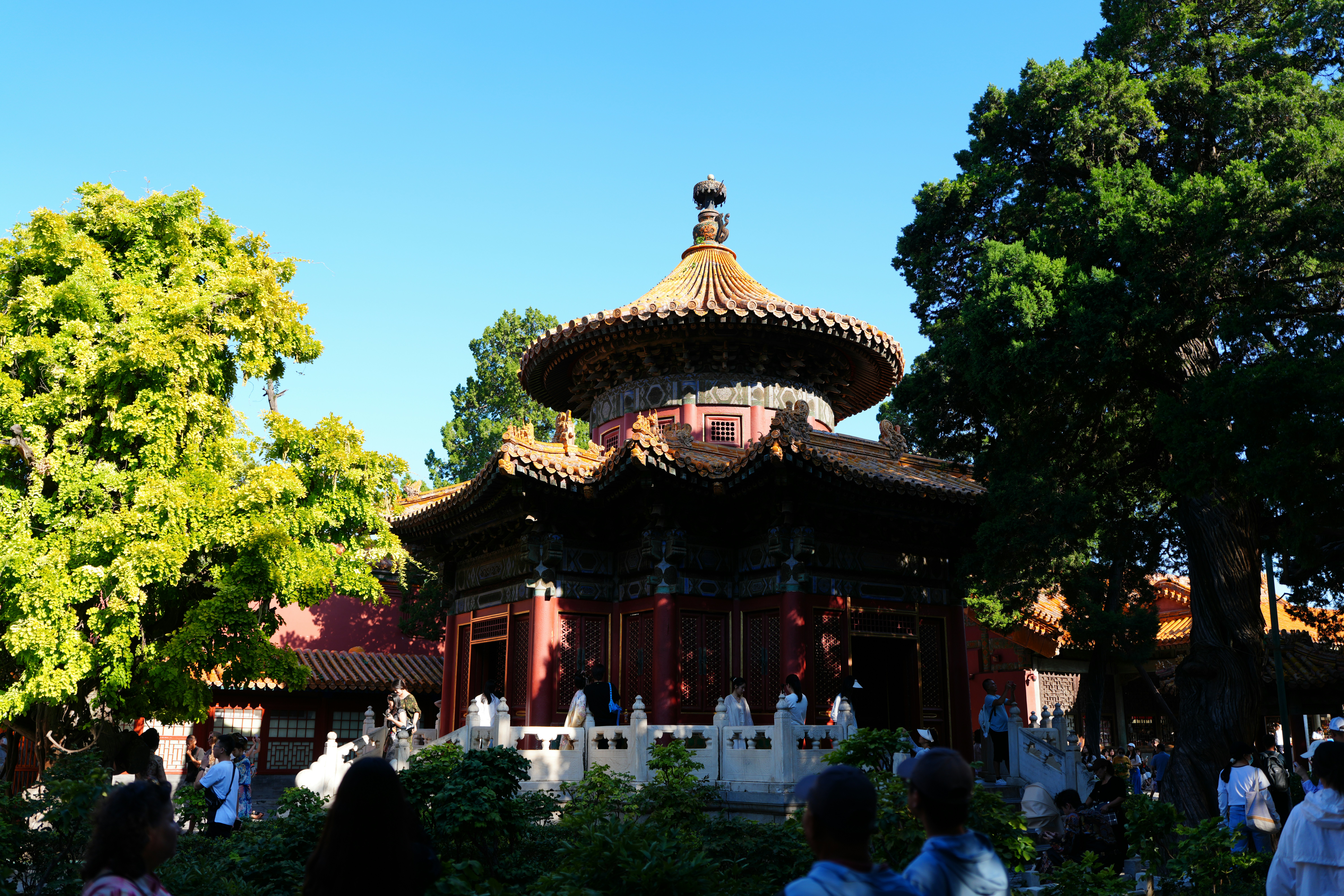 Crested Roof and Quiet Courtyard: An Ancient Pavilion in Full Sun