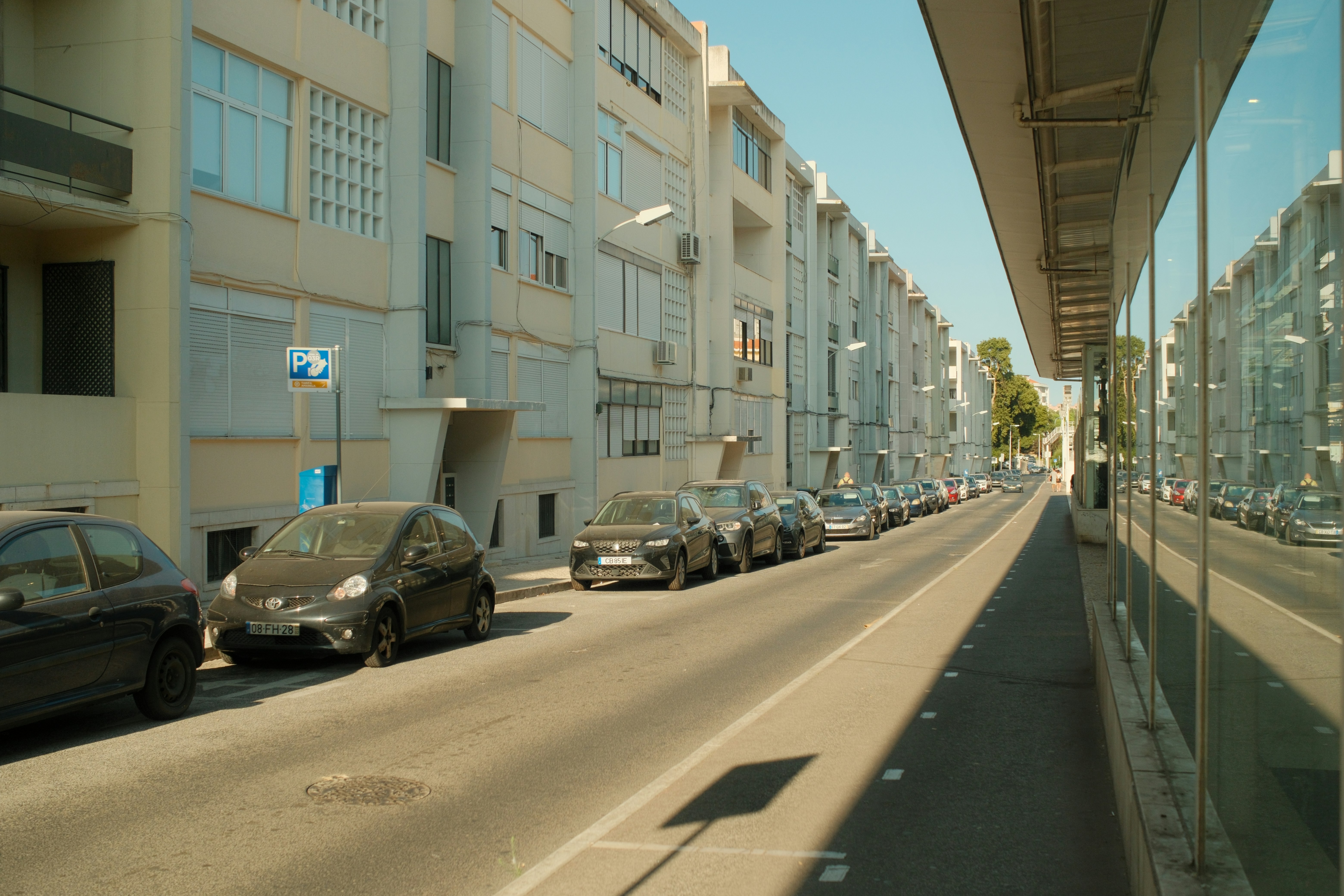 Urban Lane Under Glass: A Quiet Street Between Modern Wings