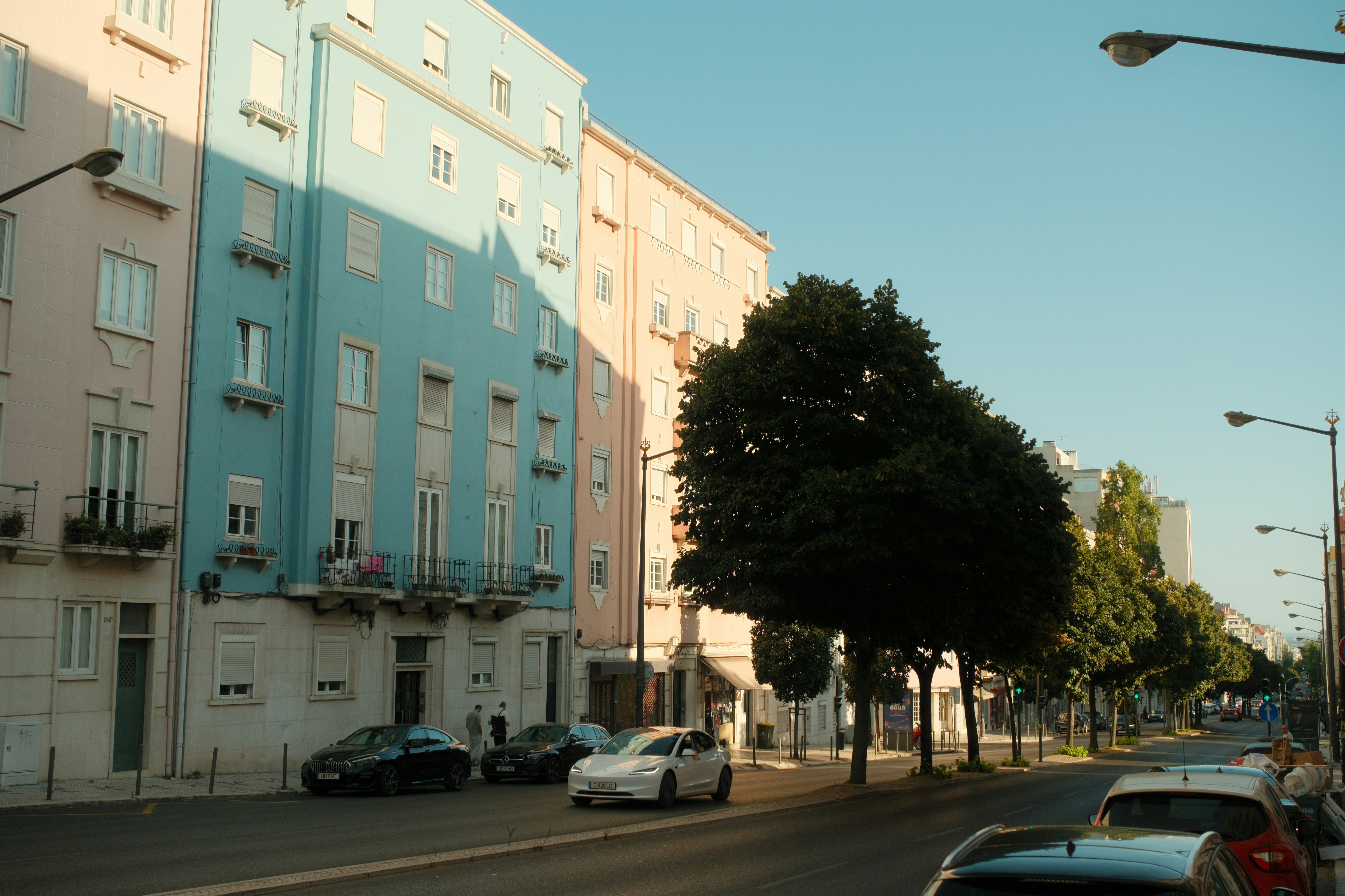 Pastel Row: Quiet Street Portrait of a Sunlit Avenue
