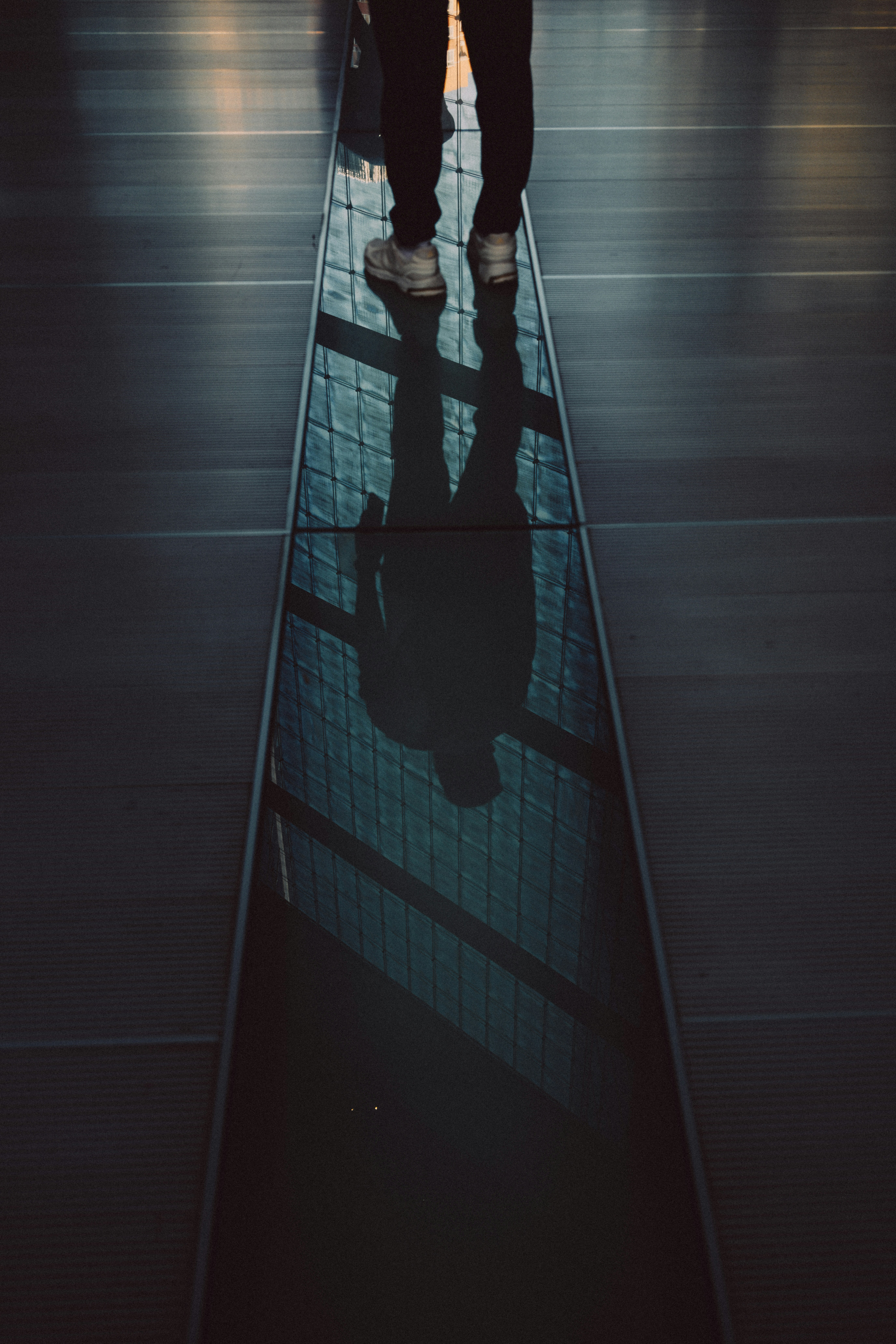 Feet on a Mirror of Steel: A Lone Walk Across a Narrow Glass Path