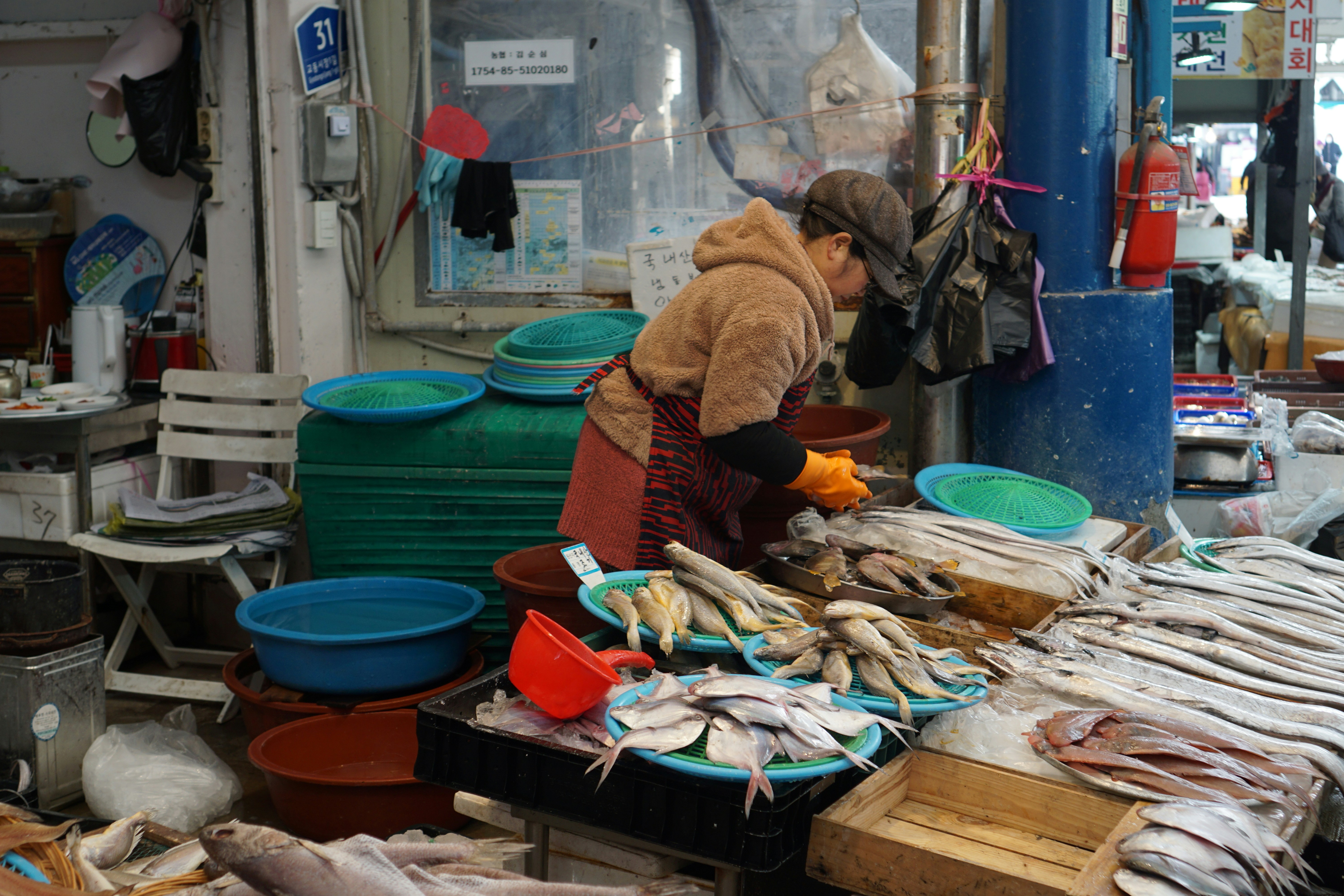 Market Fishmonger at the Bustling Waterfront Stall