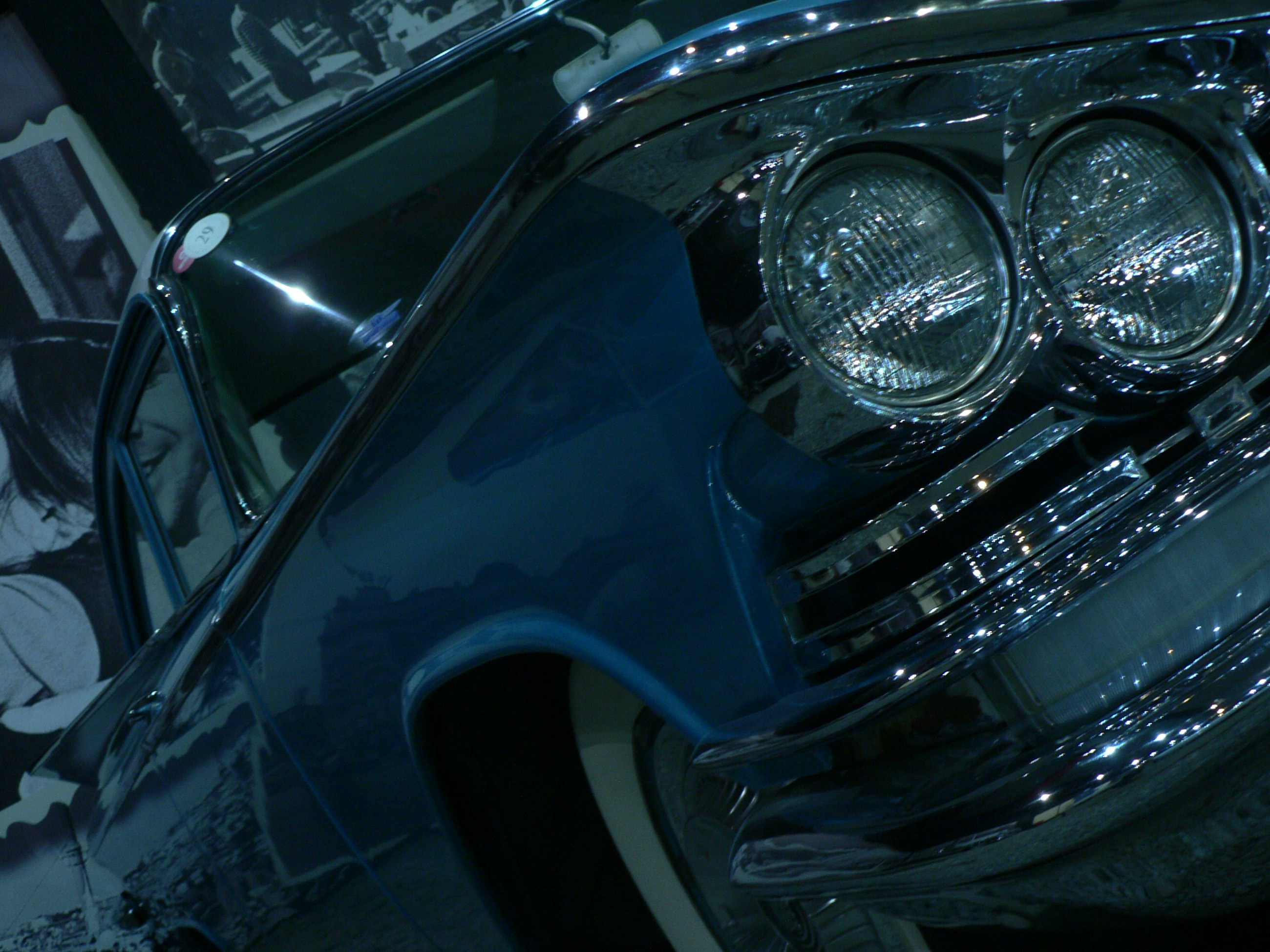 Chrome and Headlights: A Classic Car’s Blue Gaze