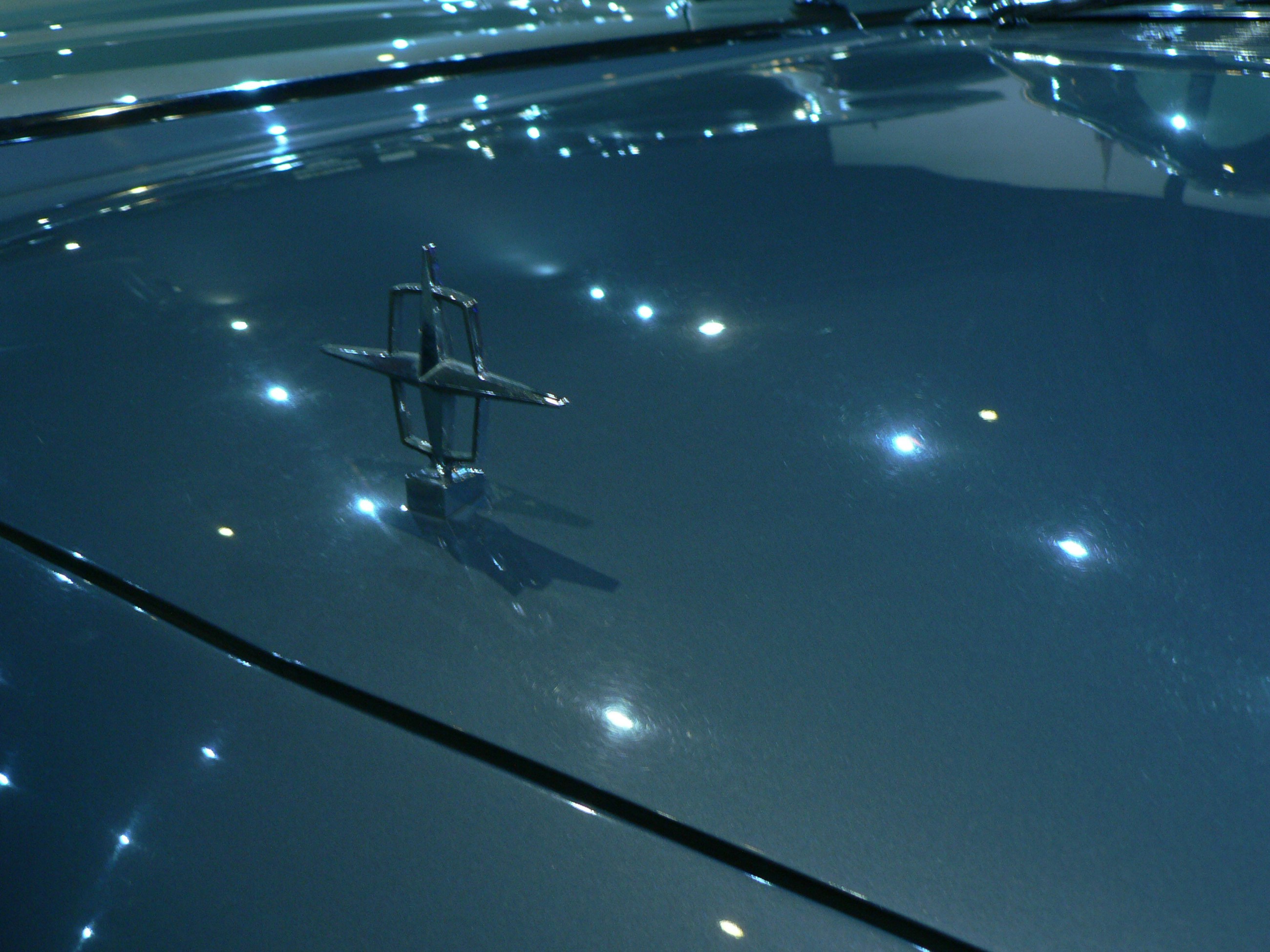 Chrome Emblem in Nightlit Car Hood