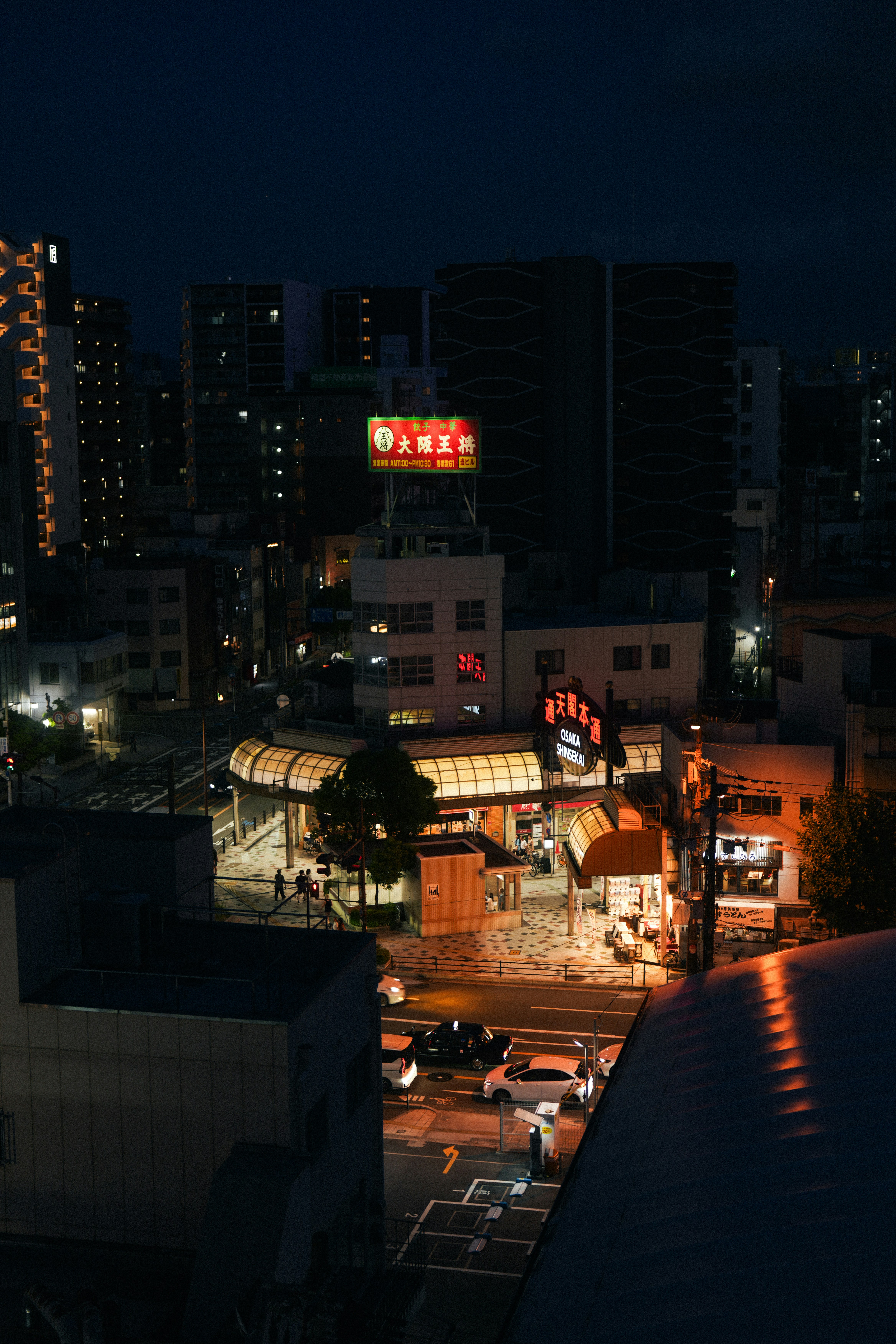 Neon Crossroads: Night Market Streaks Through Urban Silence