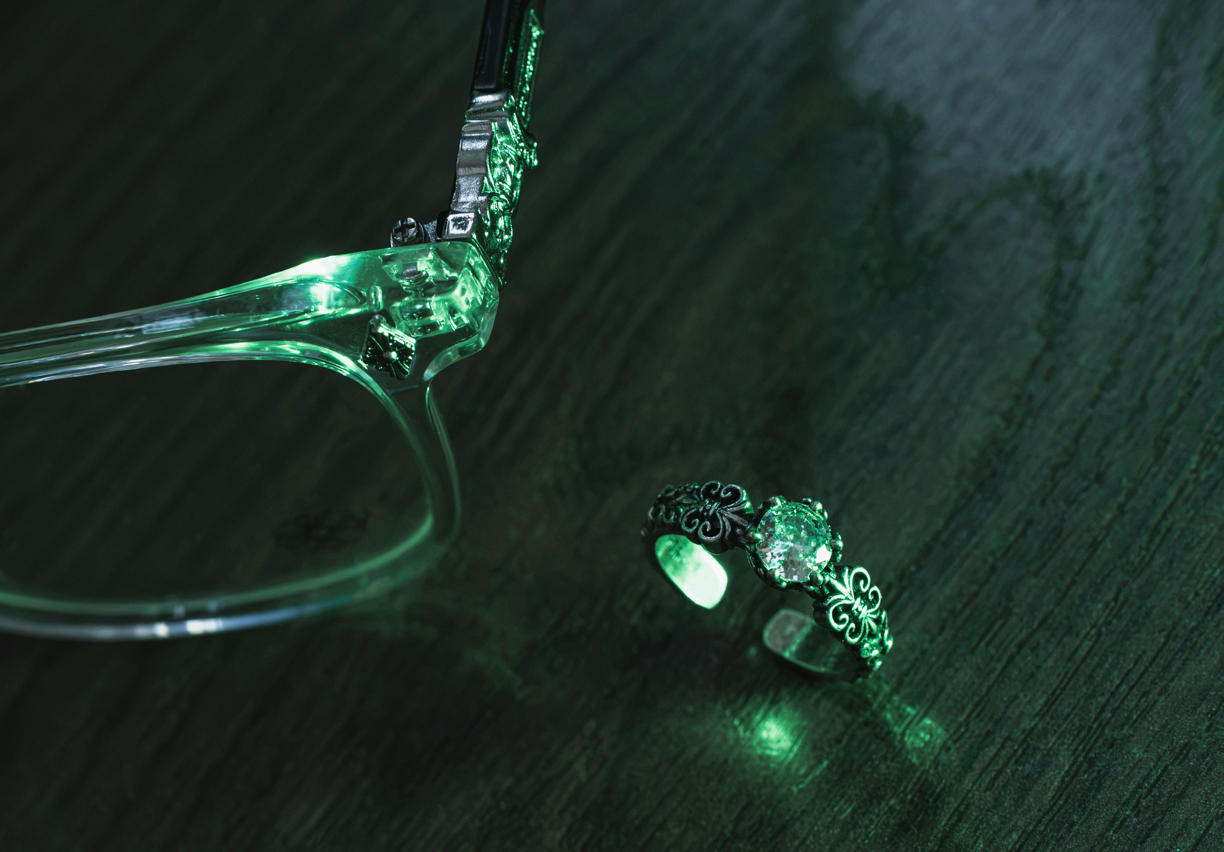 Emerald Gleam: A Glimpse of Green in Glass and Ring
