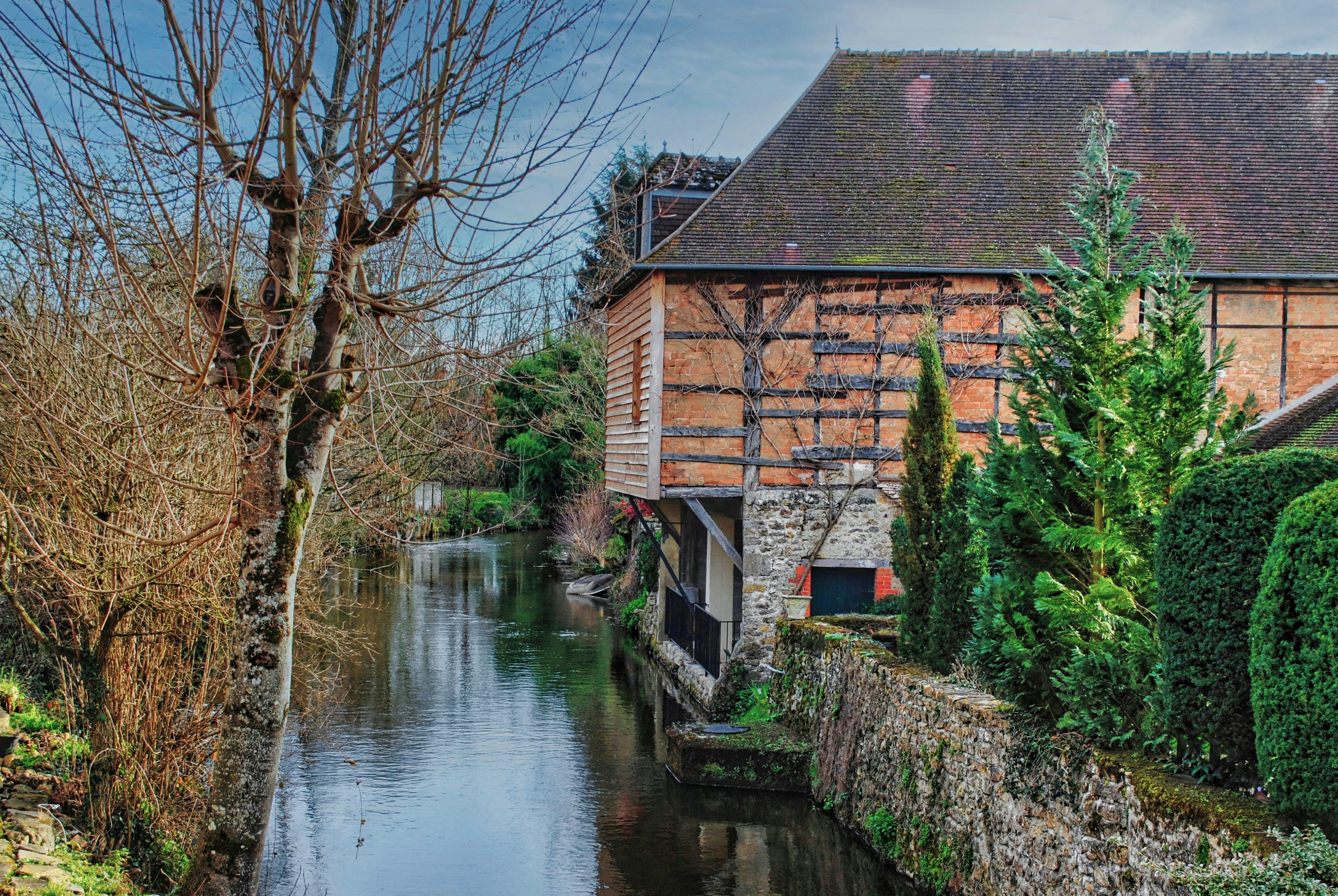 Heritage Village Along a Narrow Canal