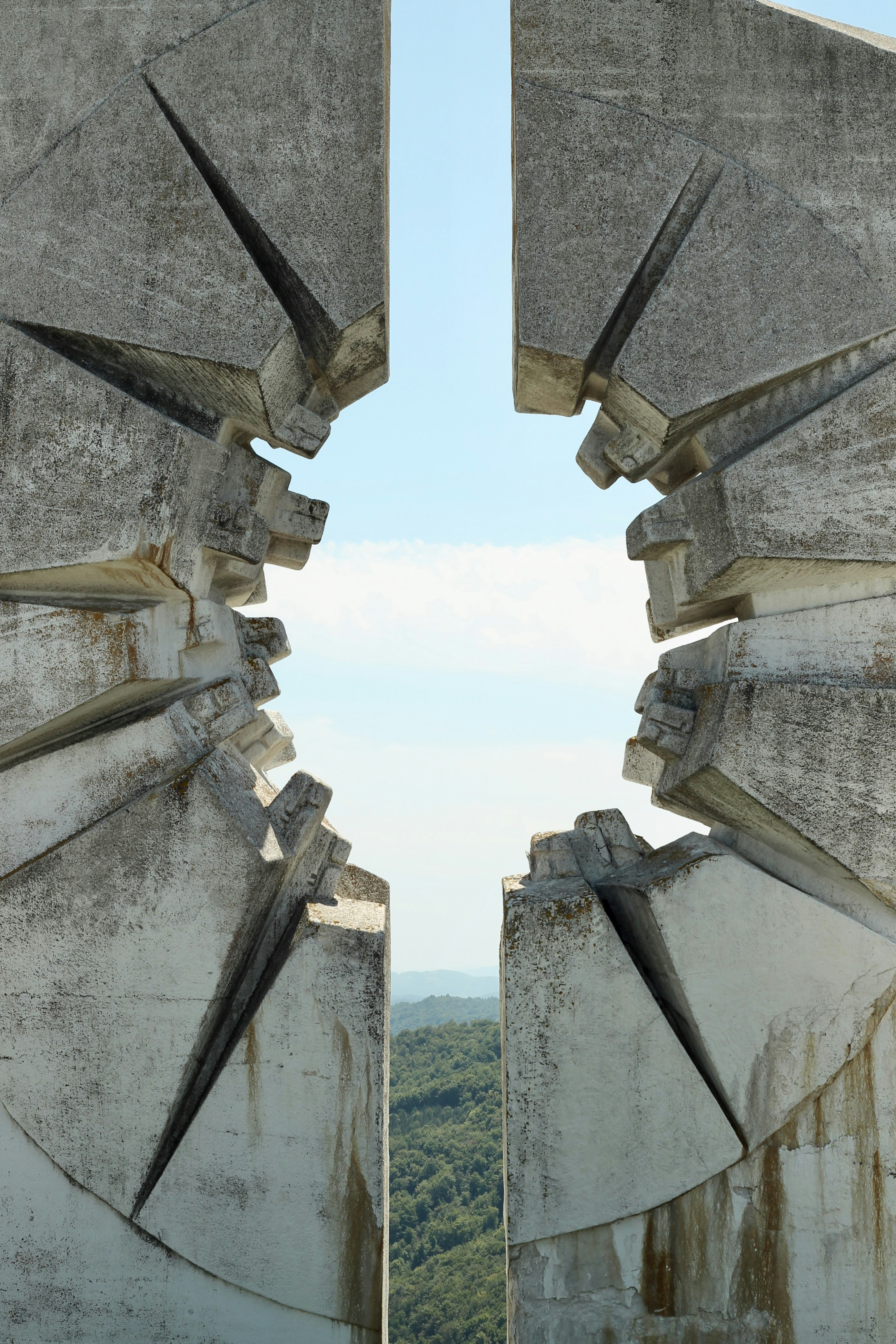 Through the Narrow Gateway: A Summit Gap Framed by Crumbling Concrete