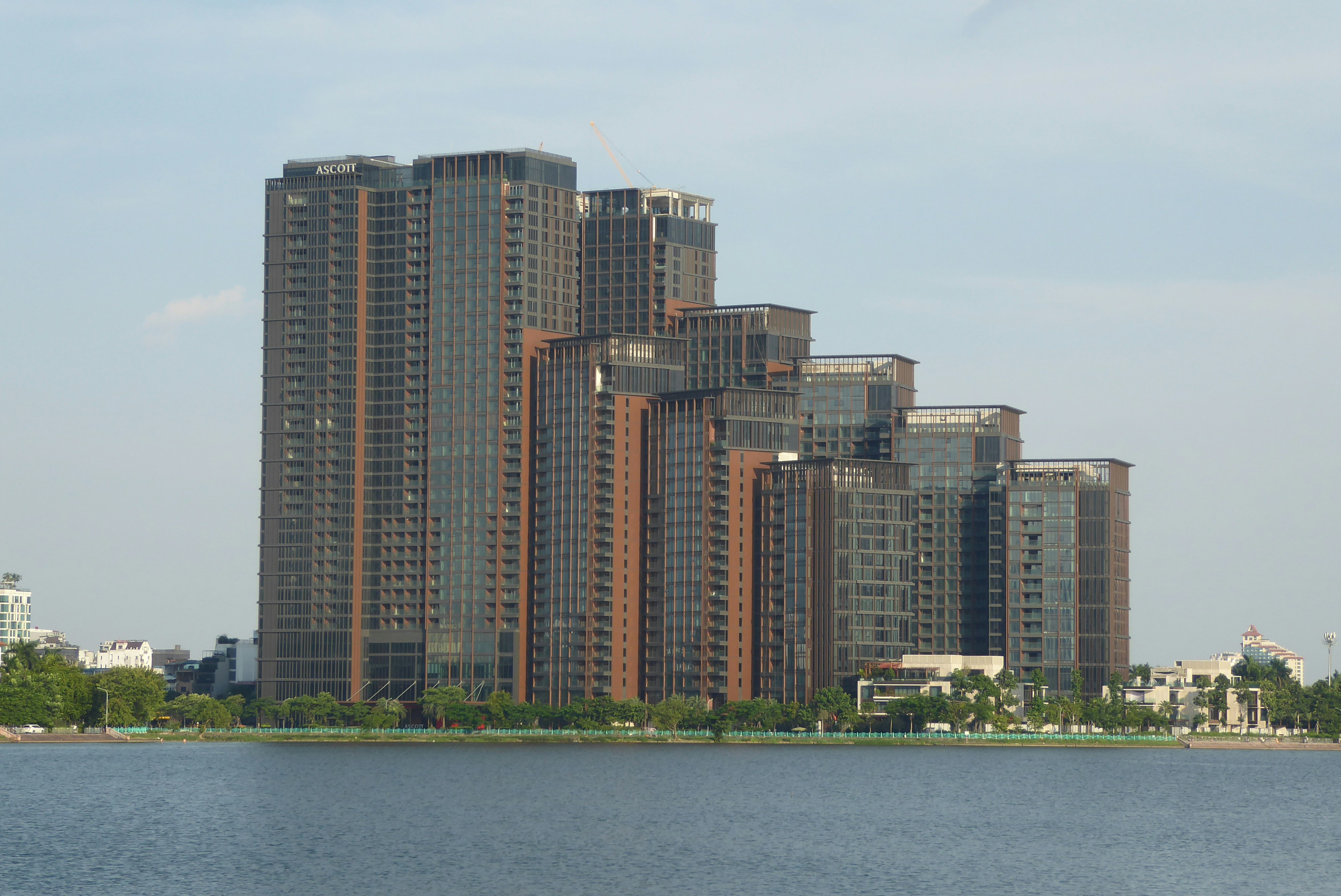 Urban Confluence: Towers Rising Along the Quiet Waterfront