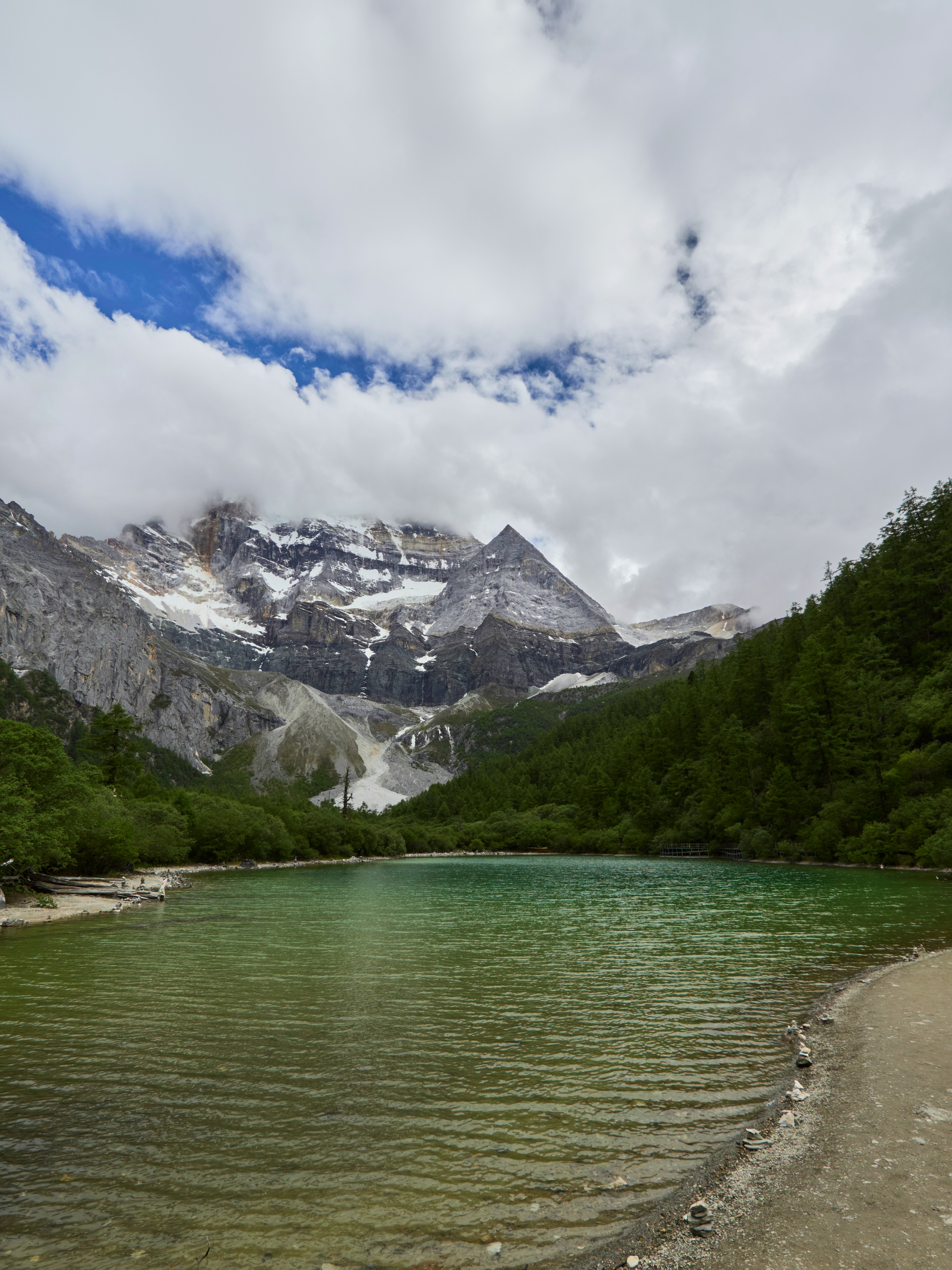 Emerald Lake Quietly Crowned by Snowy Peaks