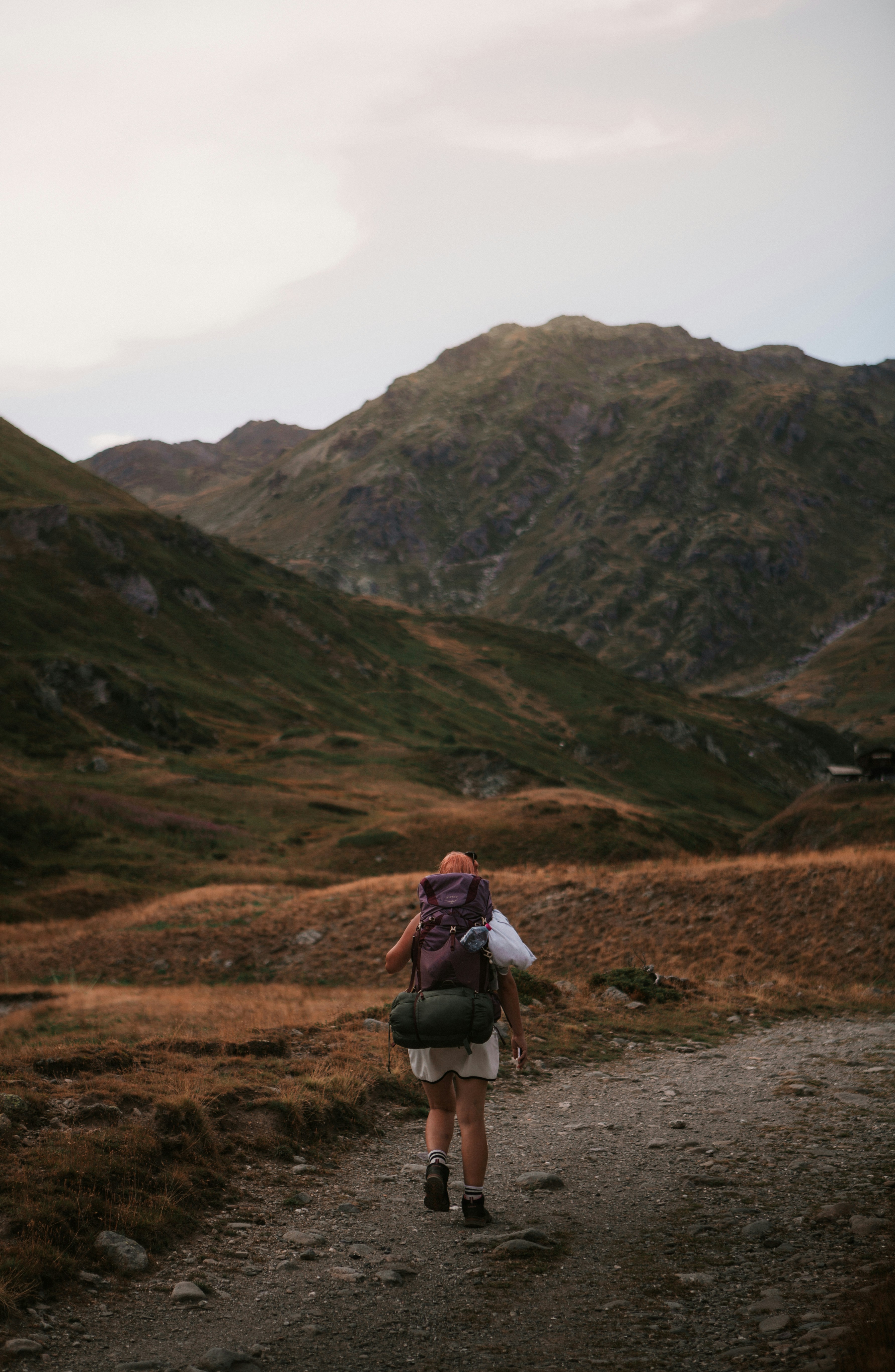 Hiker’s Ascent: A solitary trek through a rugged alpine bowl