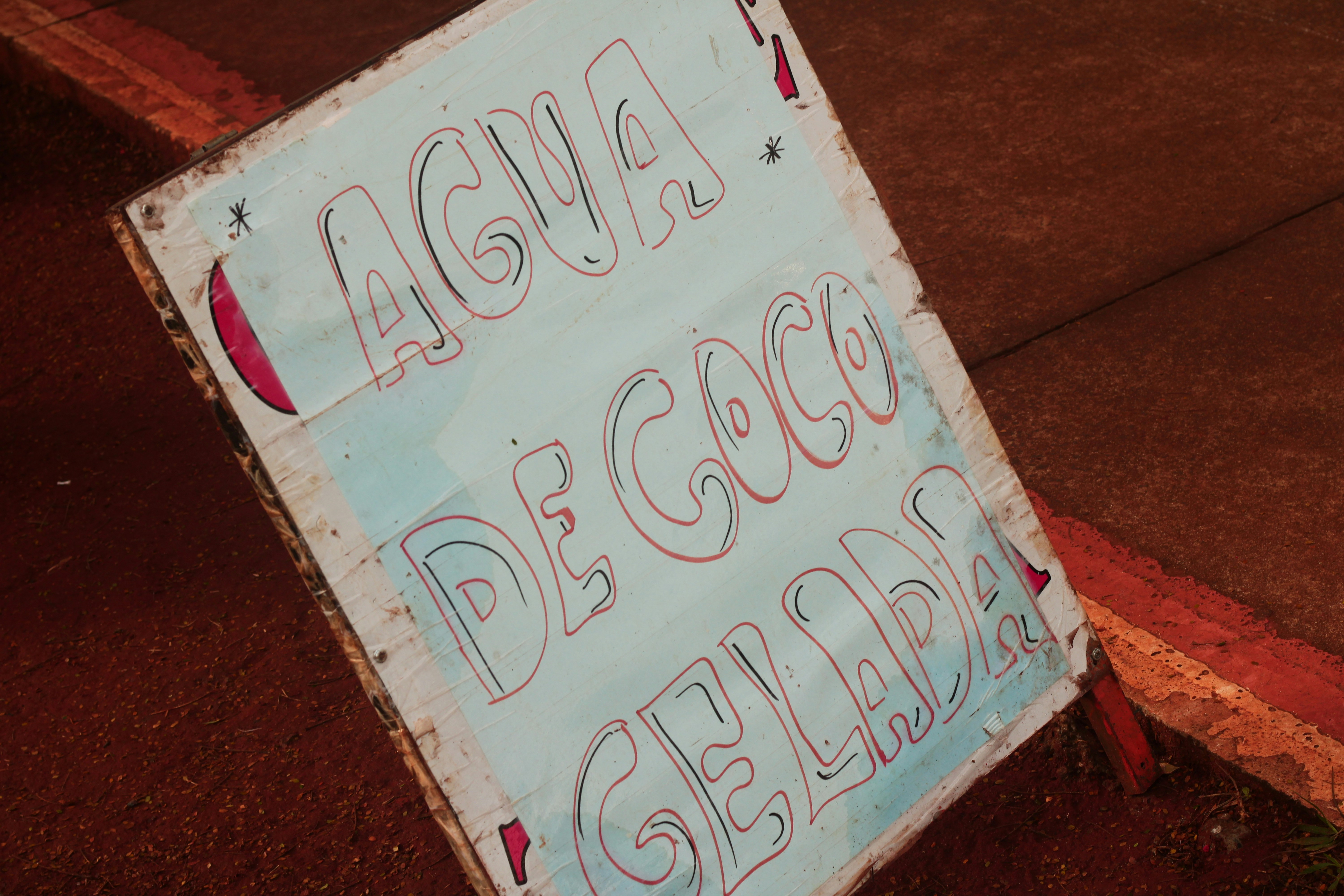 Angel of the Garden Signboard on a Rainy Street