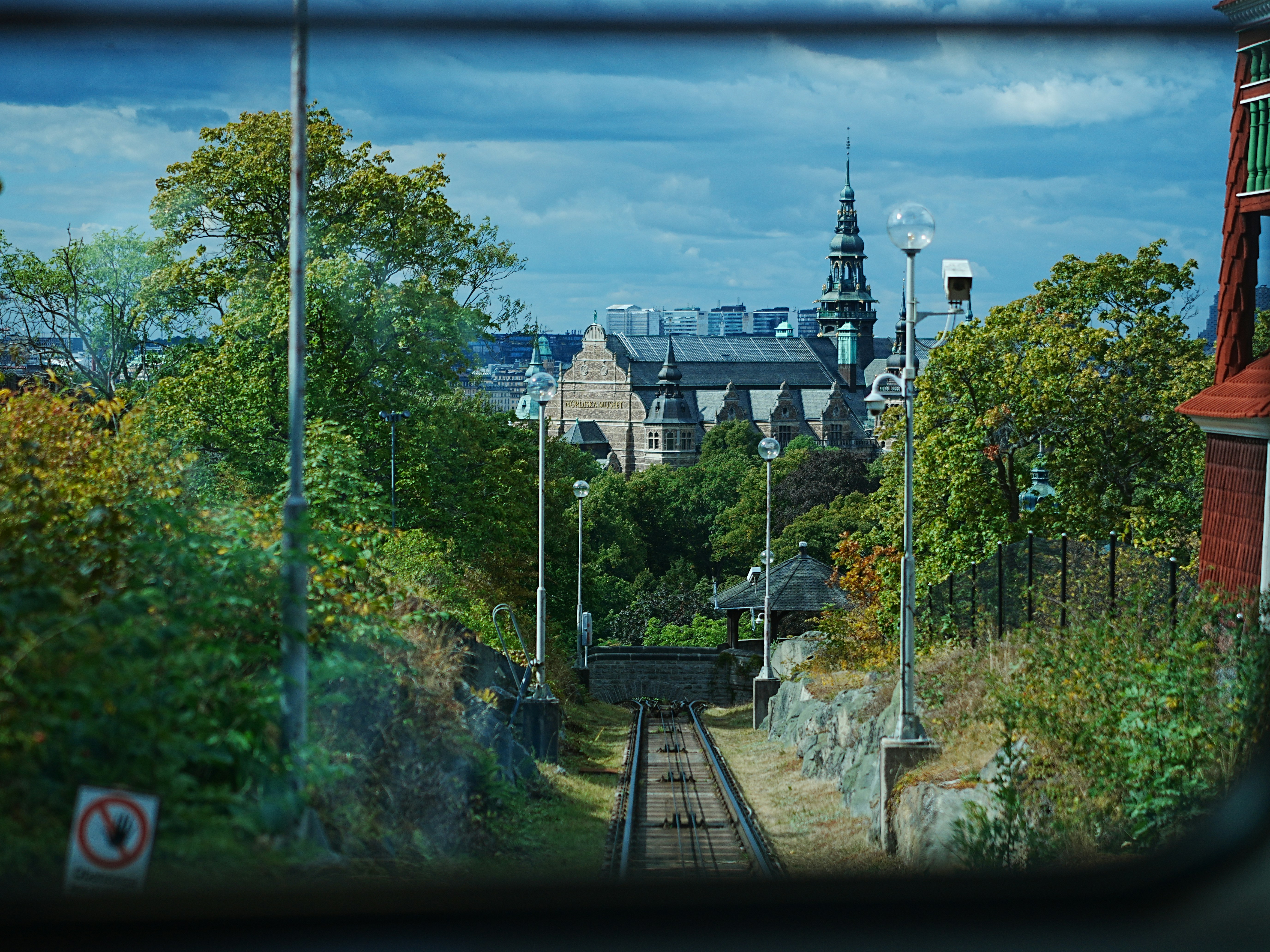 Railway to a Riverside City: A Hidden Track Through a Lush Corridor