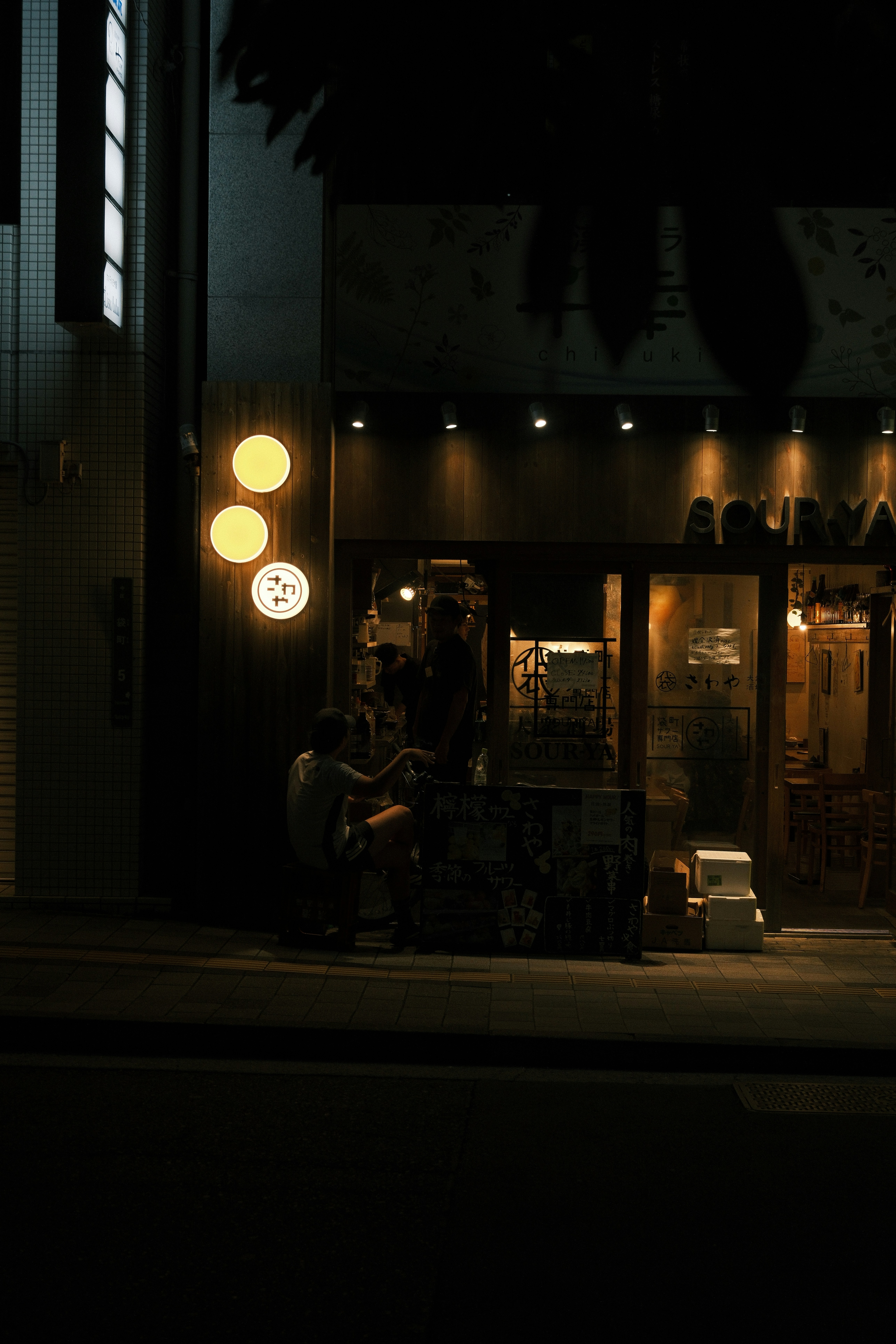 Night Pulse Outside a Quiet Eatery